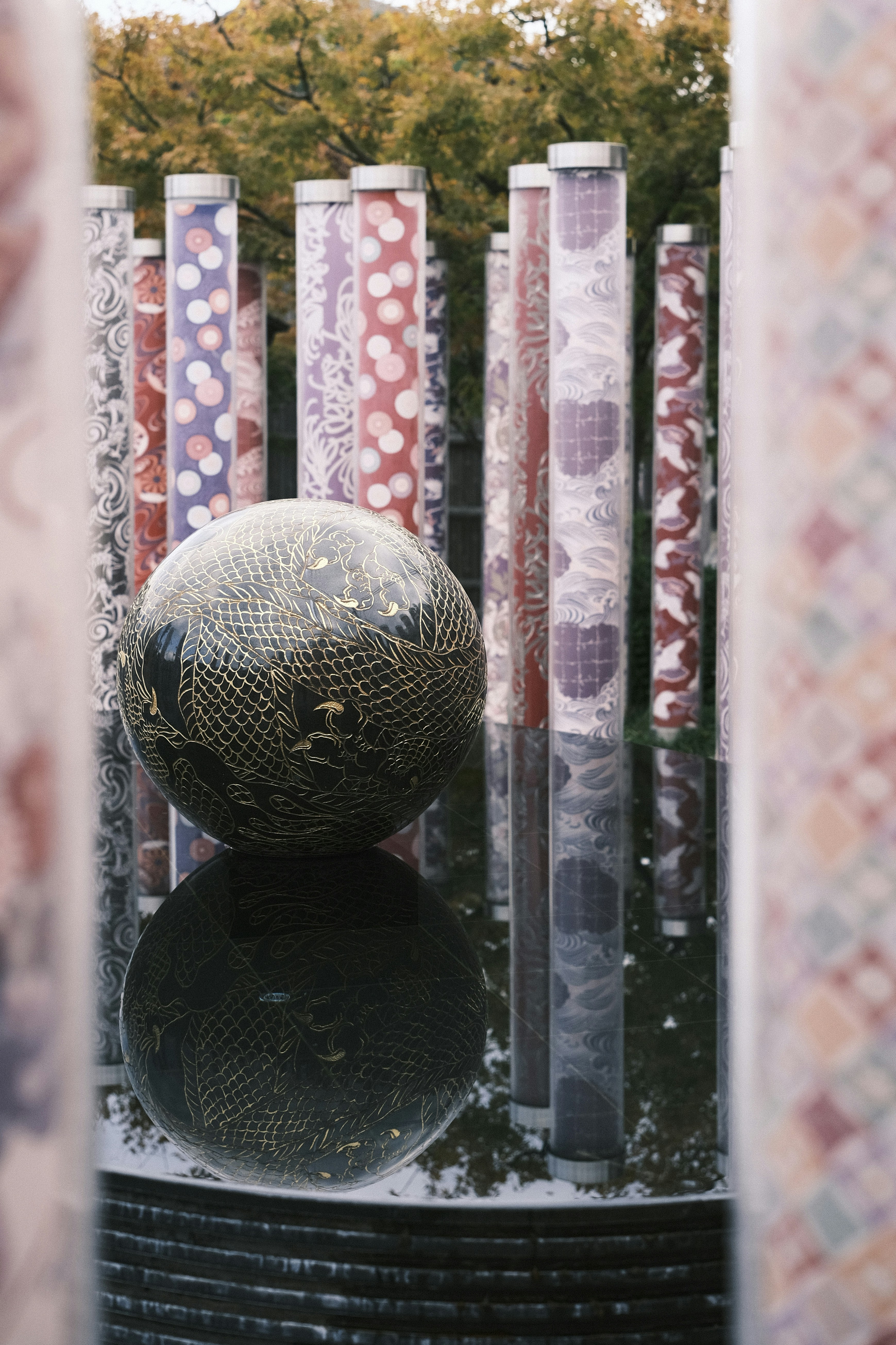 Mirrored Sphere Among Ornate Columns