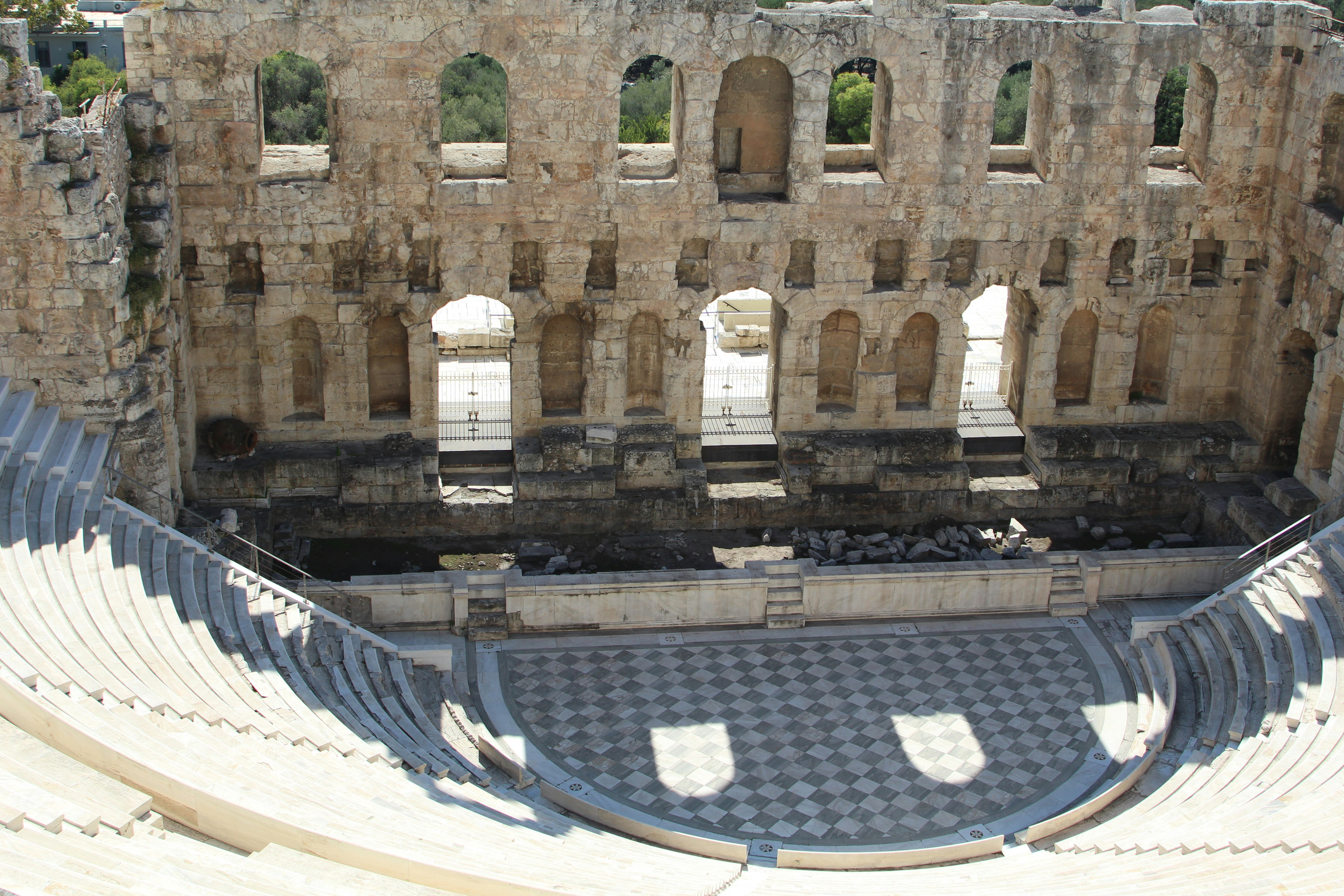 Ancient stone amphitheater with tiered seating and stage. photo – Free ...