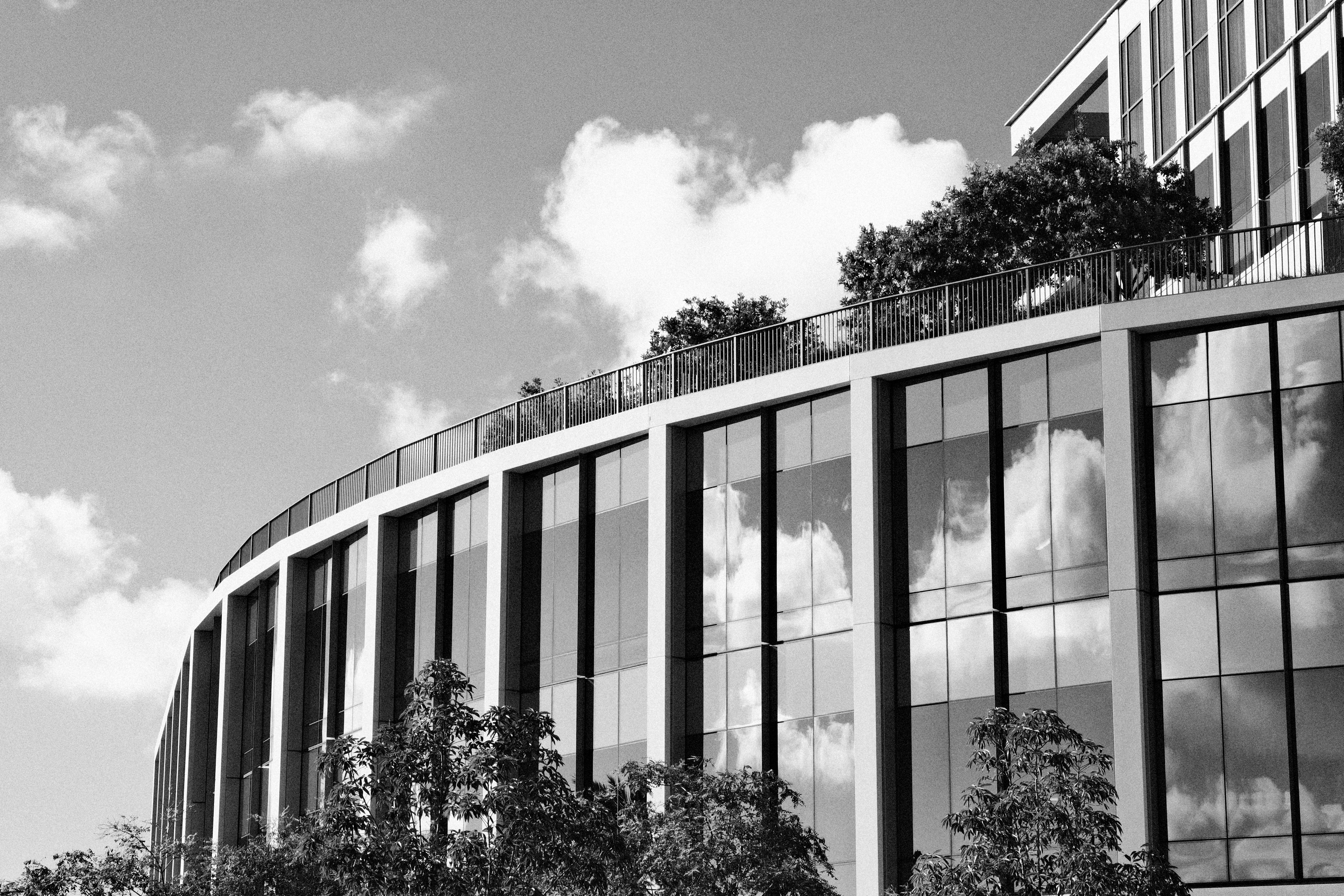 Glass Facade Reflections on a Curved Office Wing