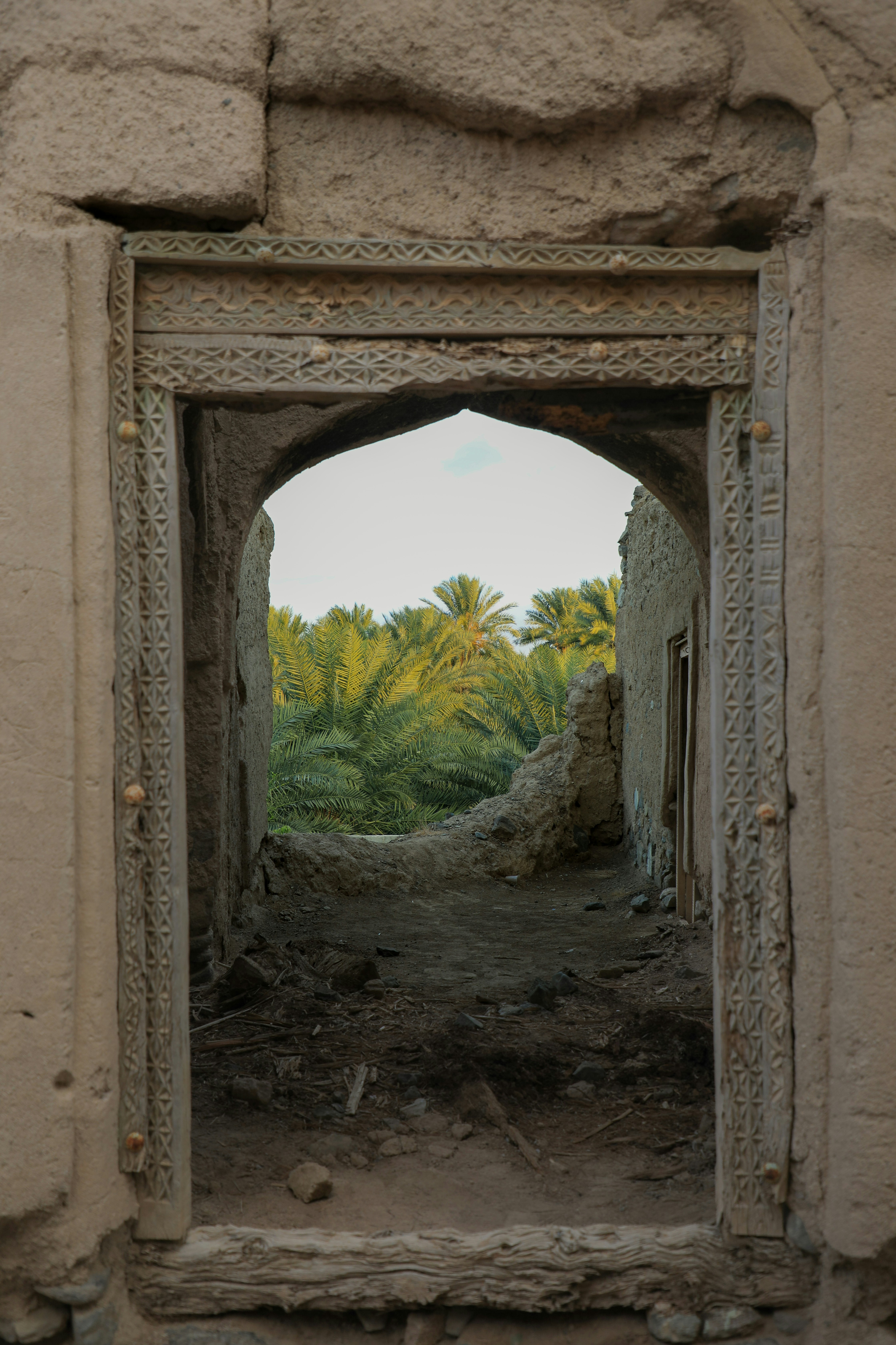 Deserted Archway to Green Oasis