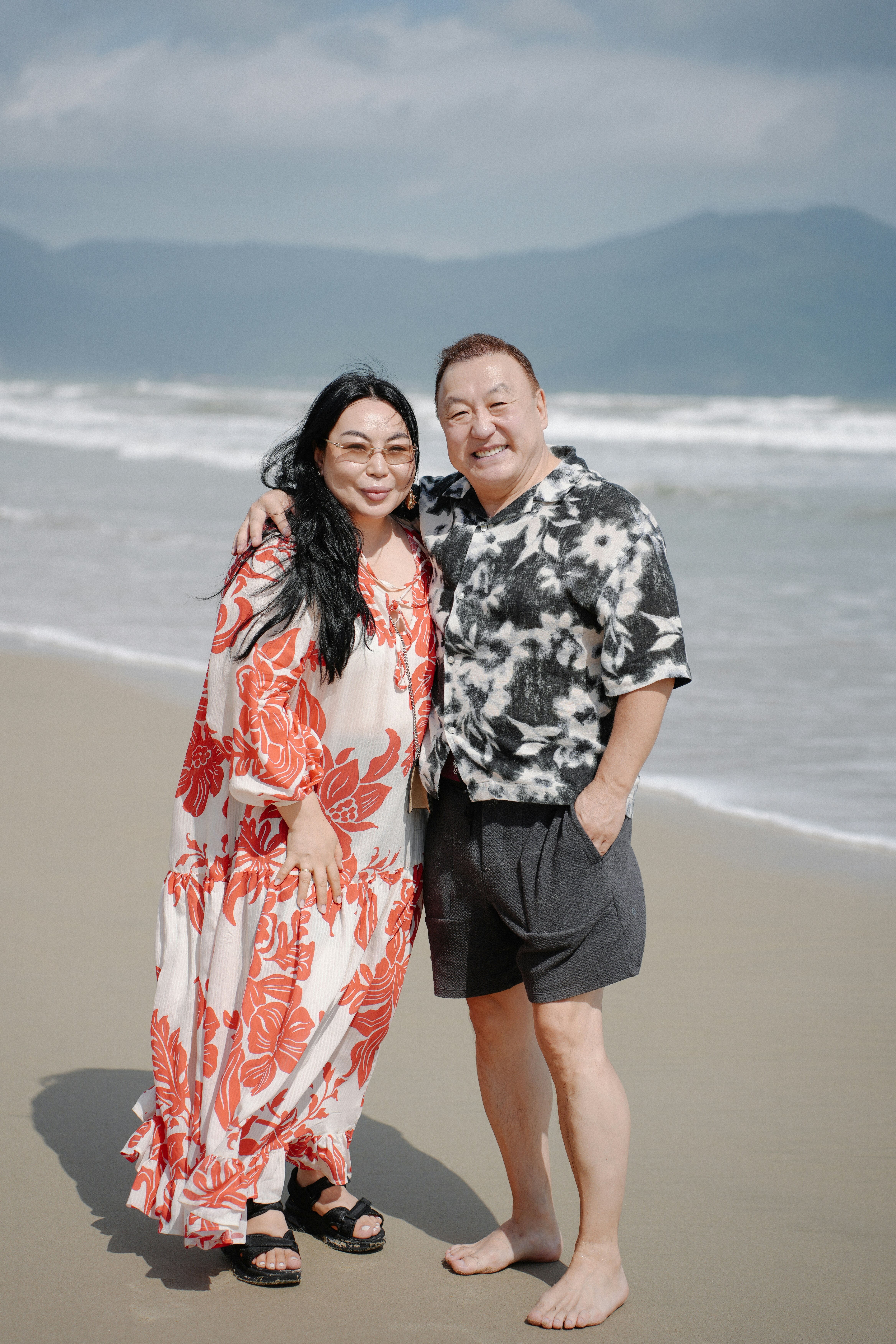 Beach Portrait of a Couple on a Sunlit Shore