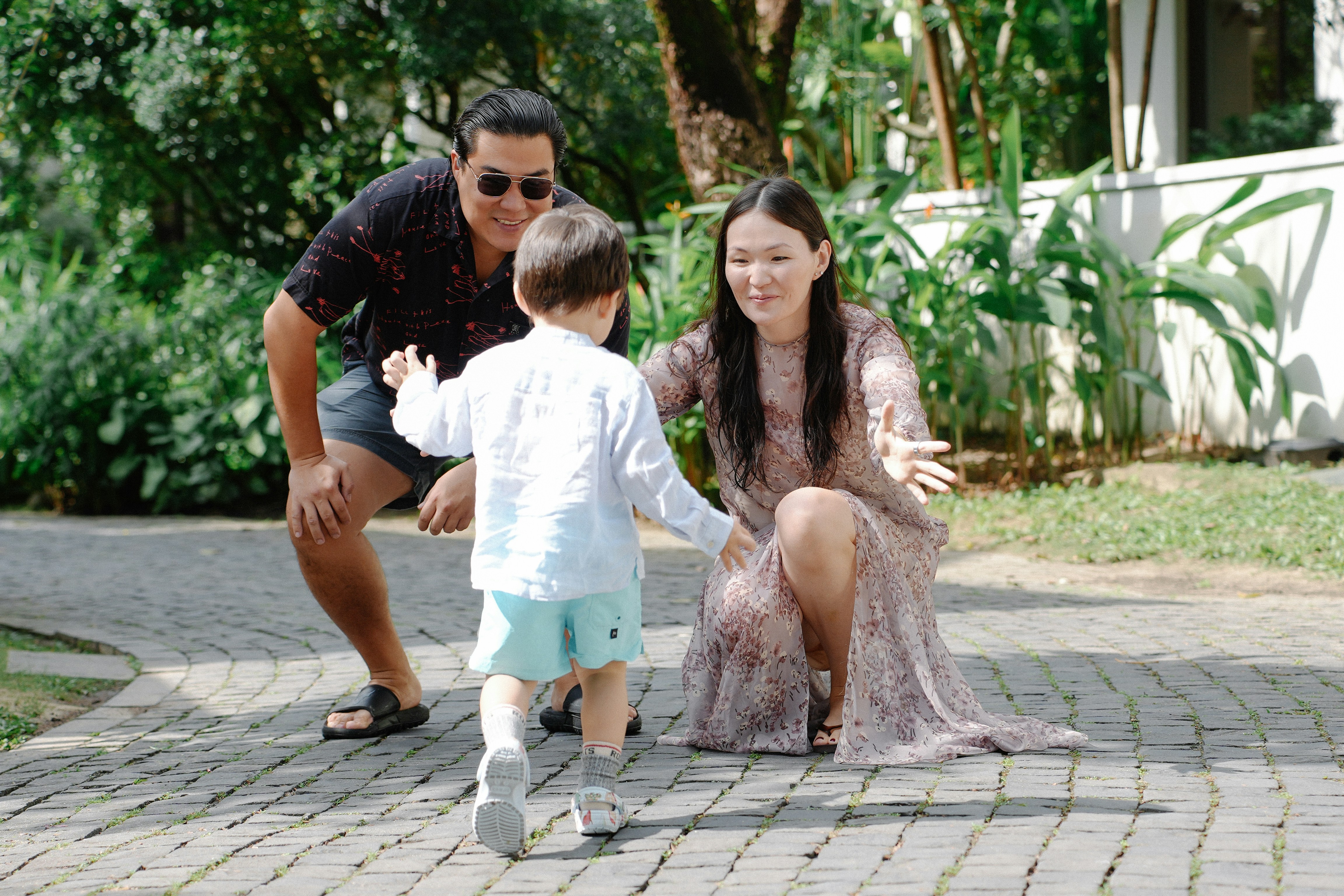 Parents welcoming their child outdoors