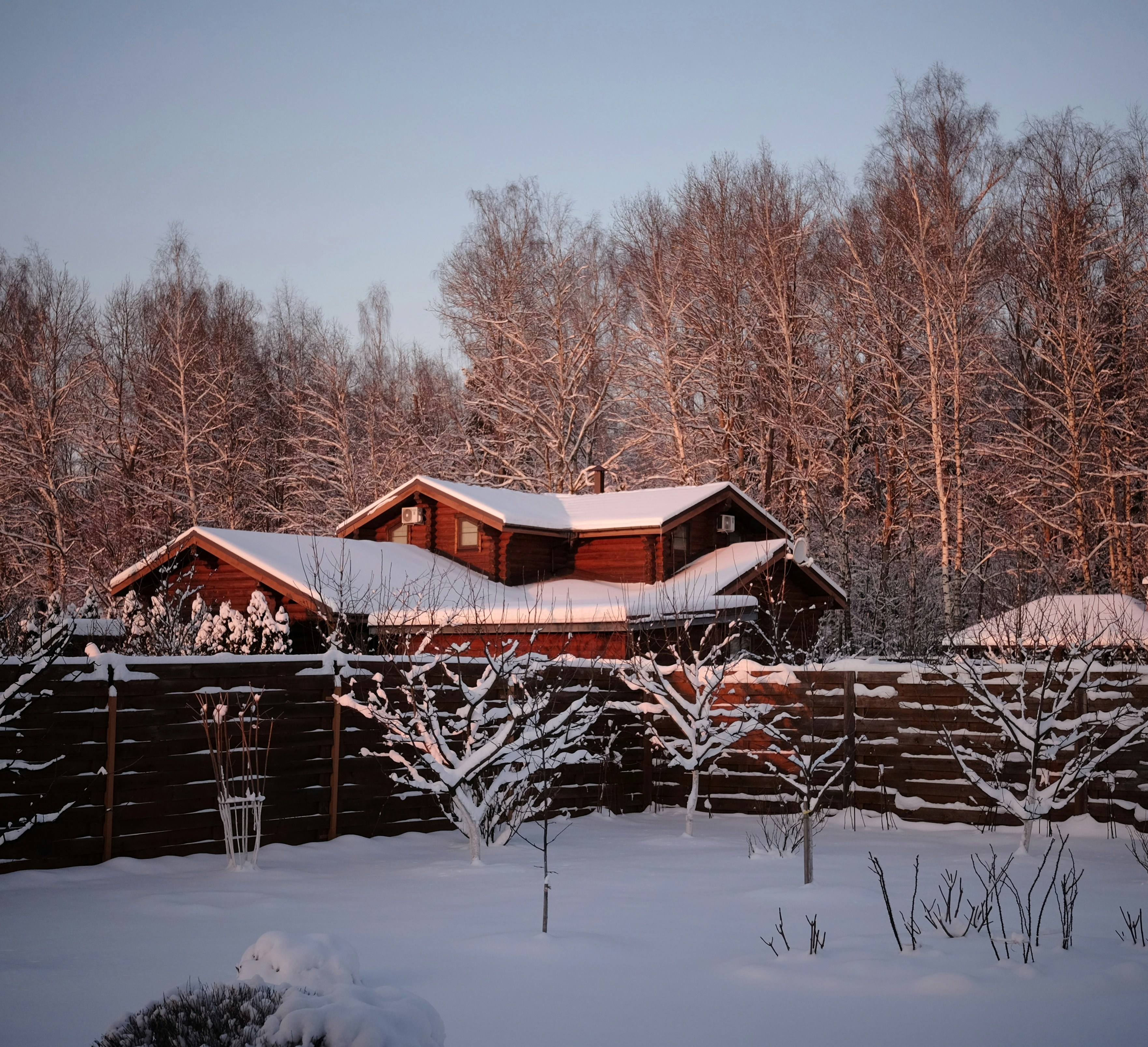 Winter Lodge Under a Pale Sunset