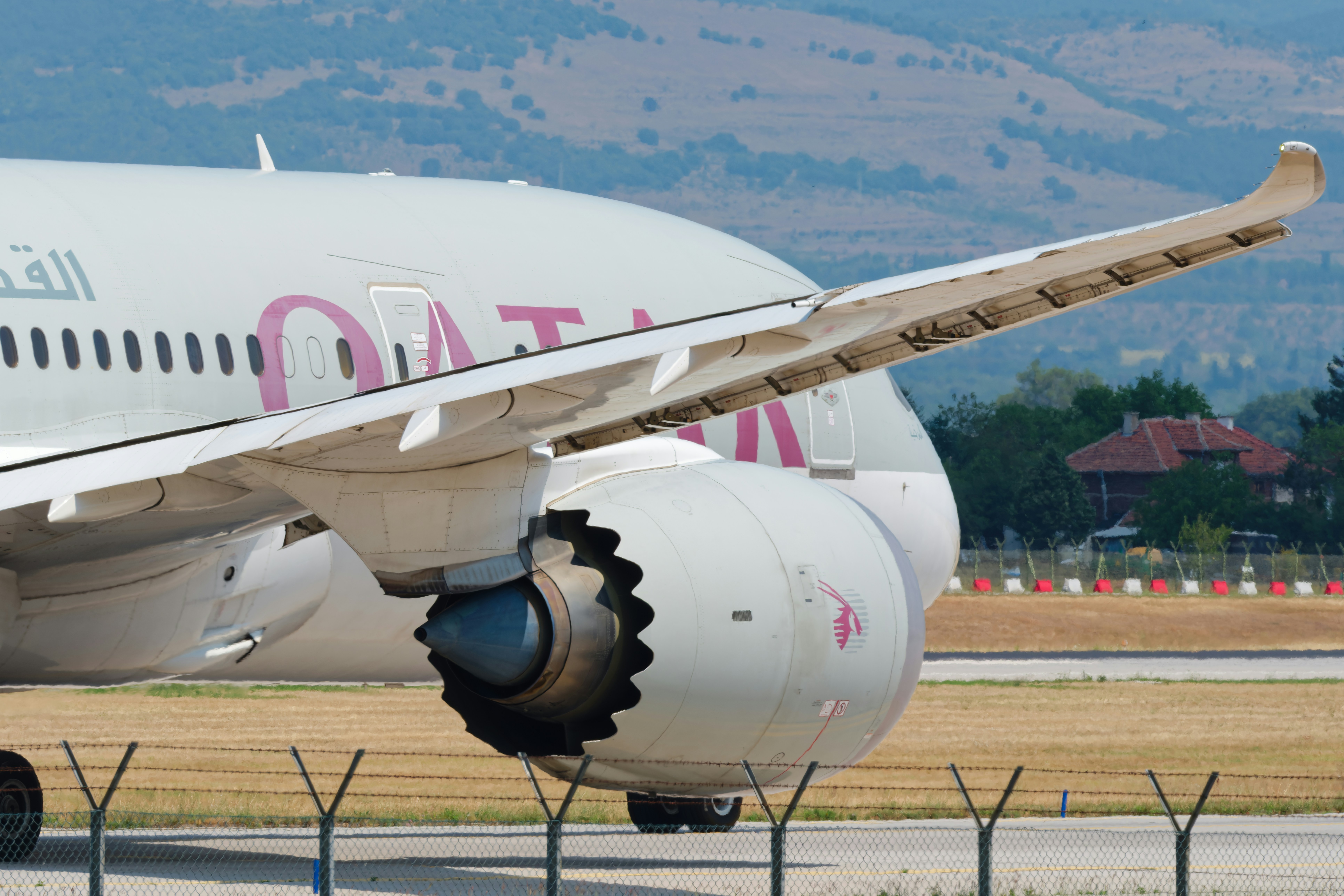 Jet in the Sunlit Gate: Turbofan and Wing at Tarmac