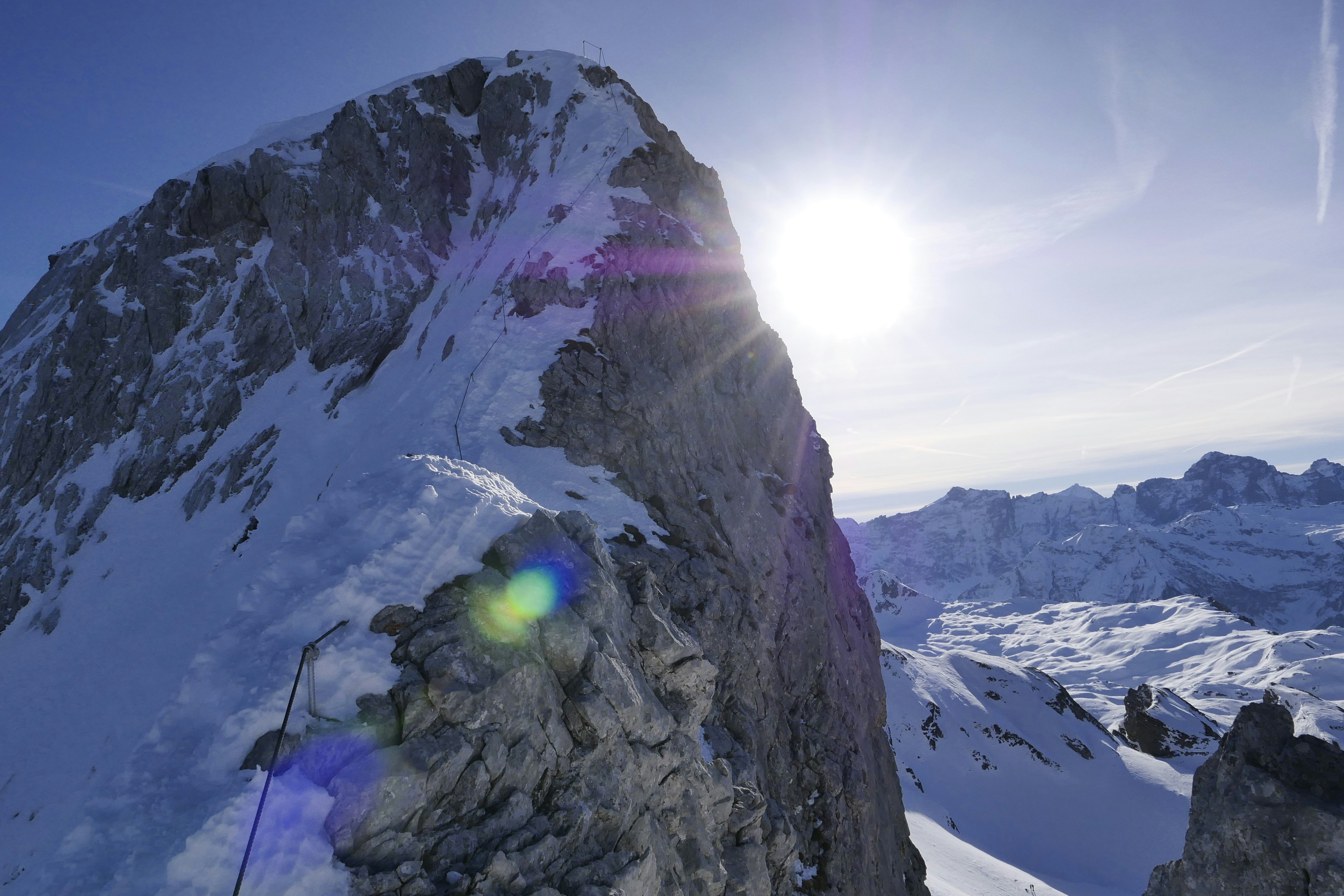 Sunlit Peak: A Razor of Snow and Sky