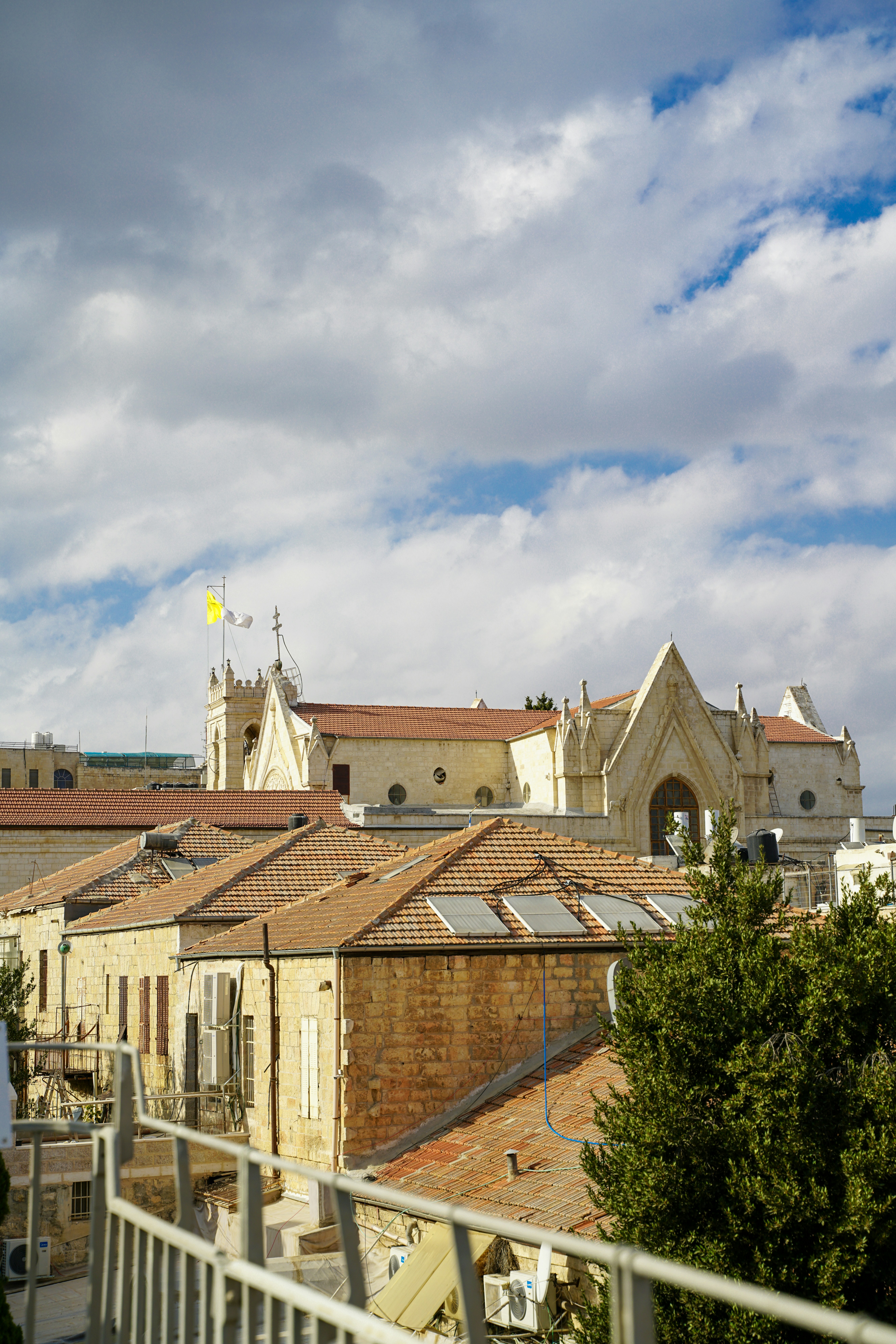 Rooftop Mosaic Under a Cerulean Sky