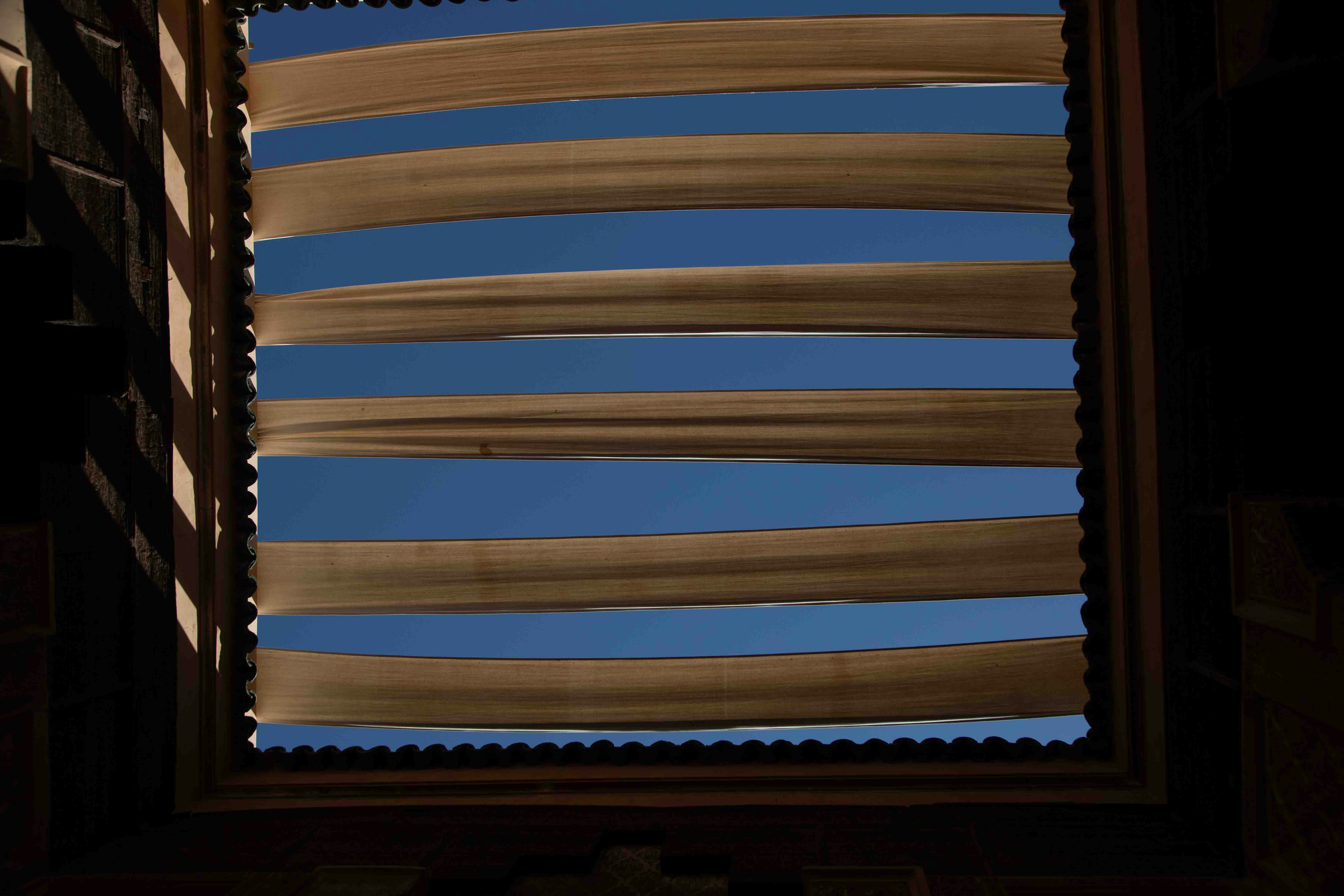 Skylight Looms: Strips of Sky Through Architectural Framing