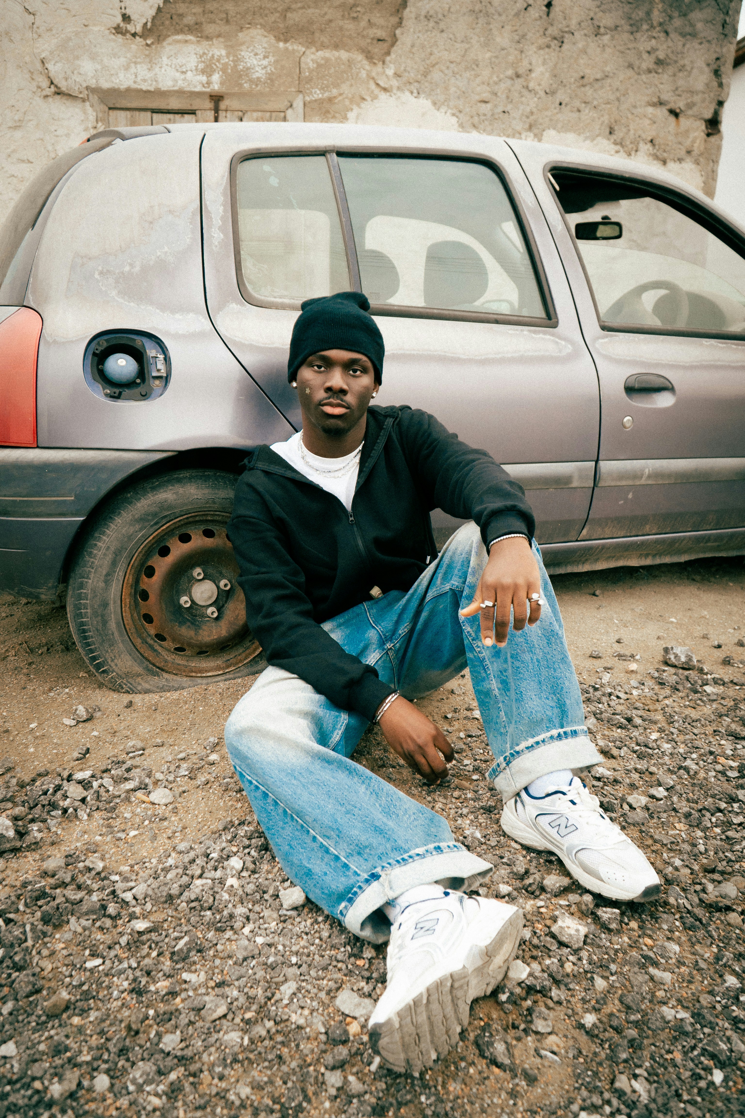 Sidelined in Style: A Quiet Moment by the Worn Car