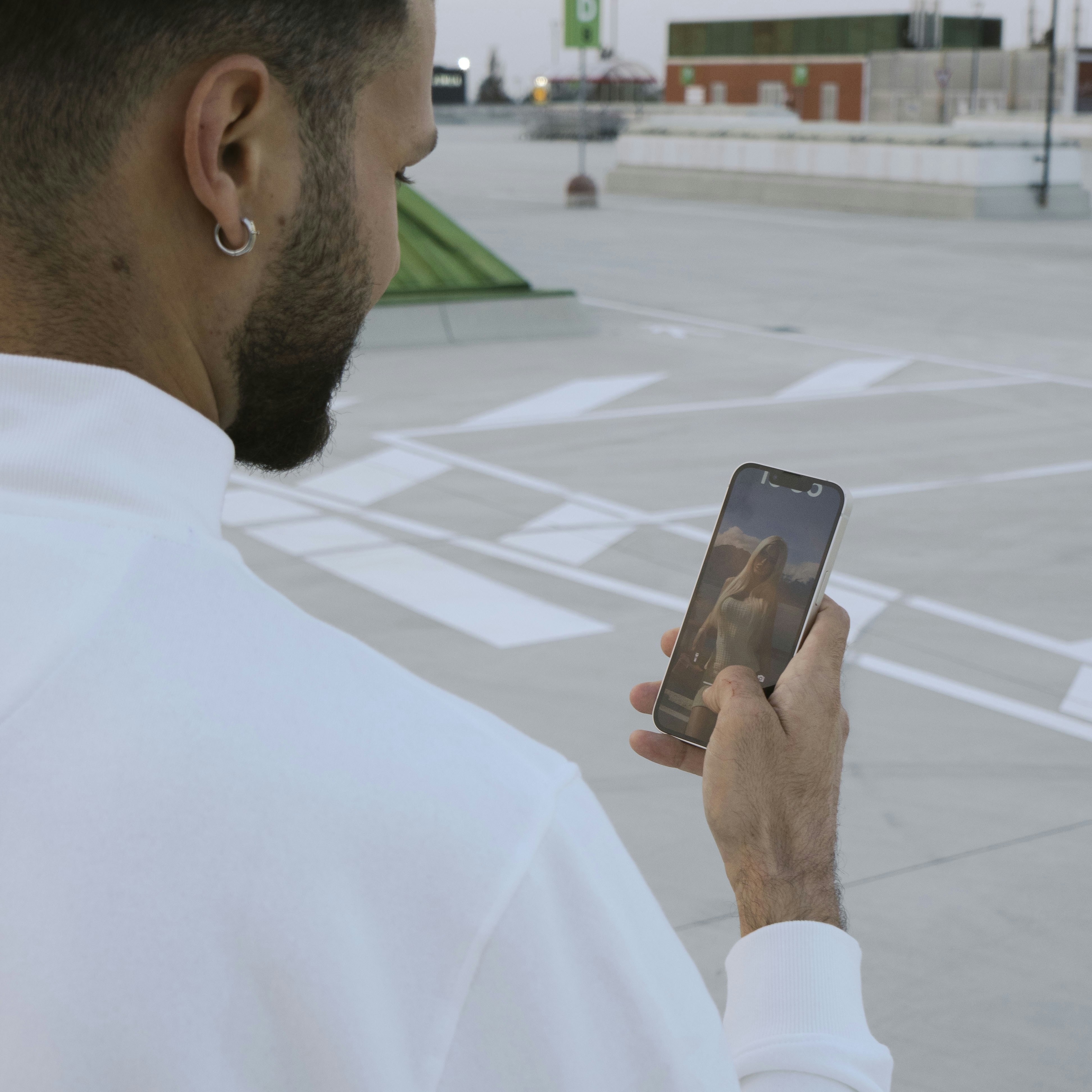 Portrait on a Rooftop: Focused Moment with a Smartphone