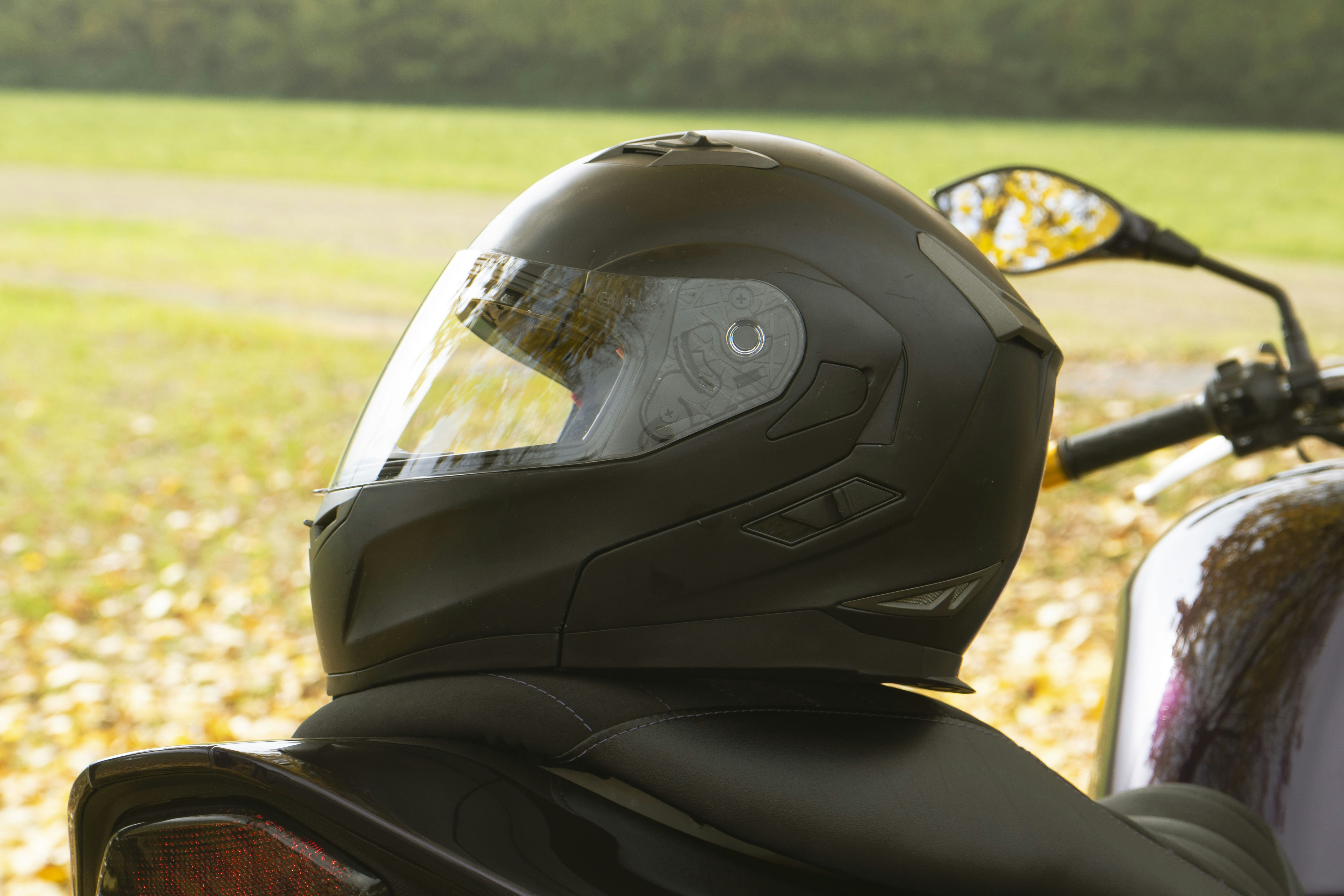 Quiet Ride: A Helmeted Focus in a Sunlit Park