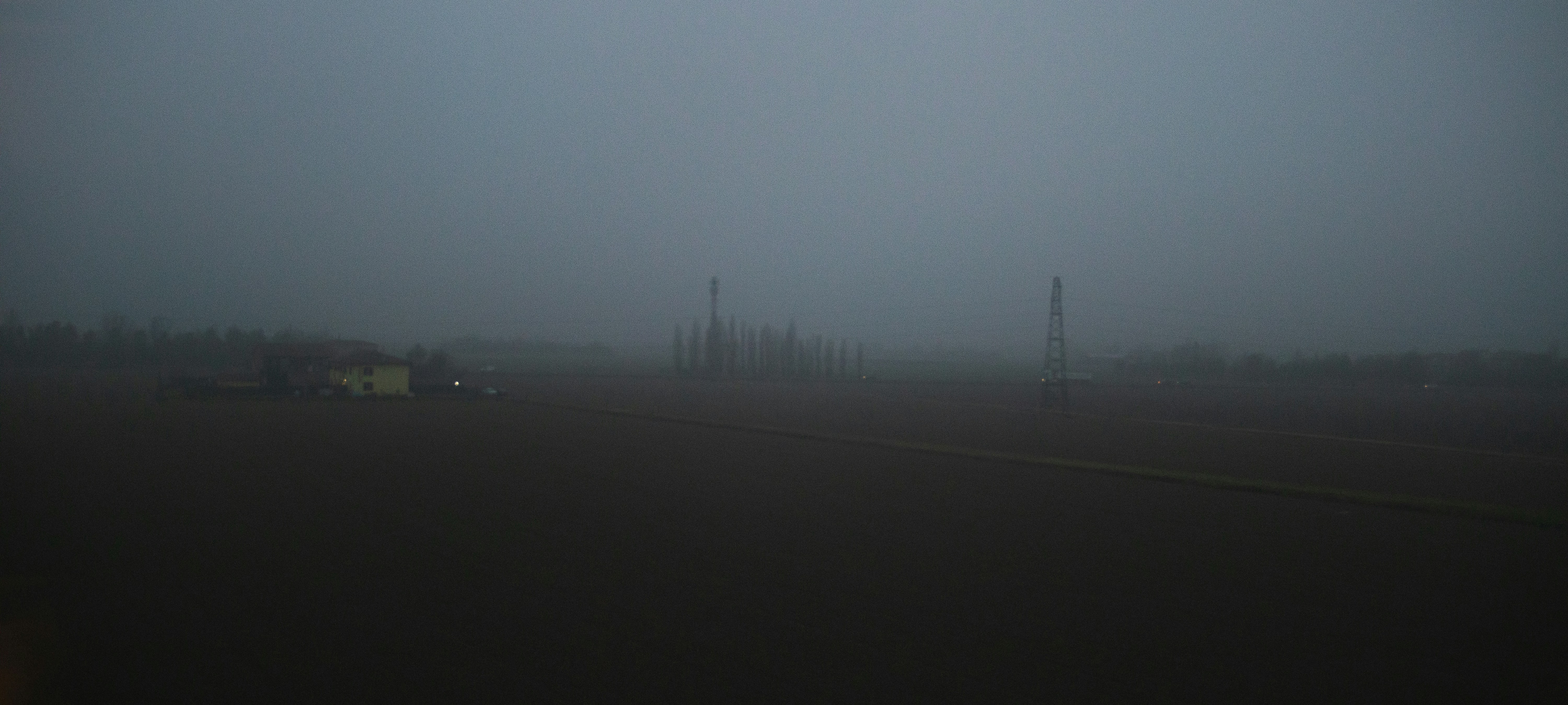 Distant Structures in Mist: A Quiet Industrial Horizon