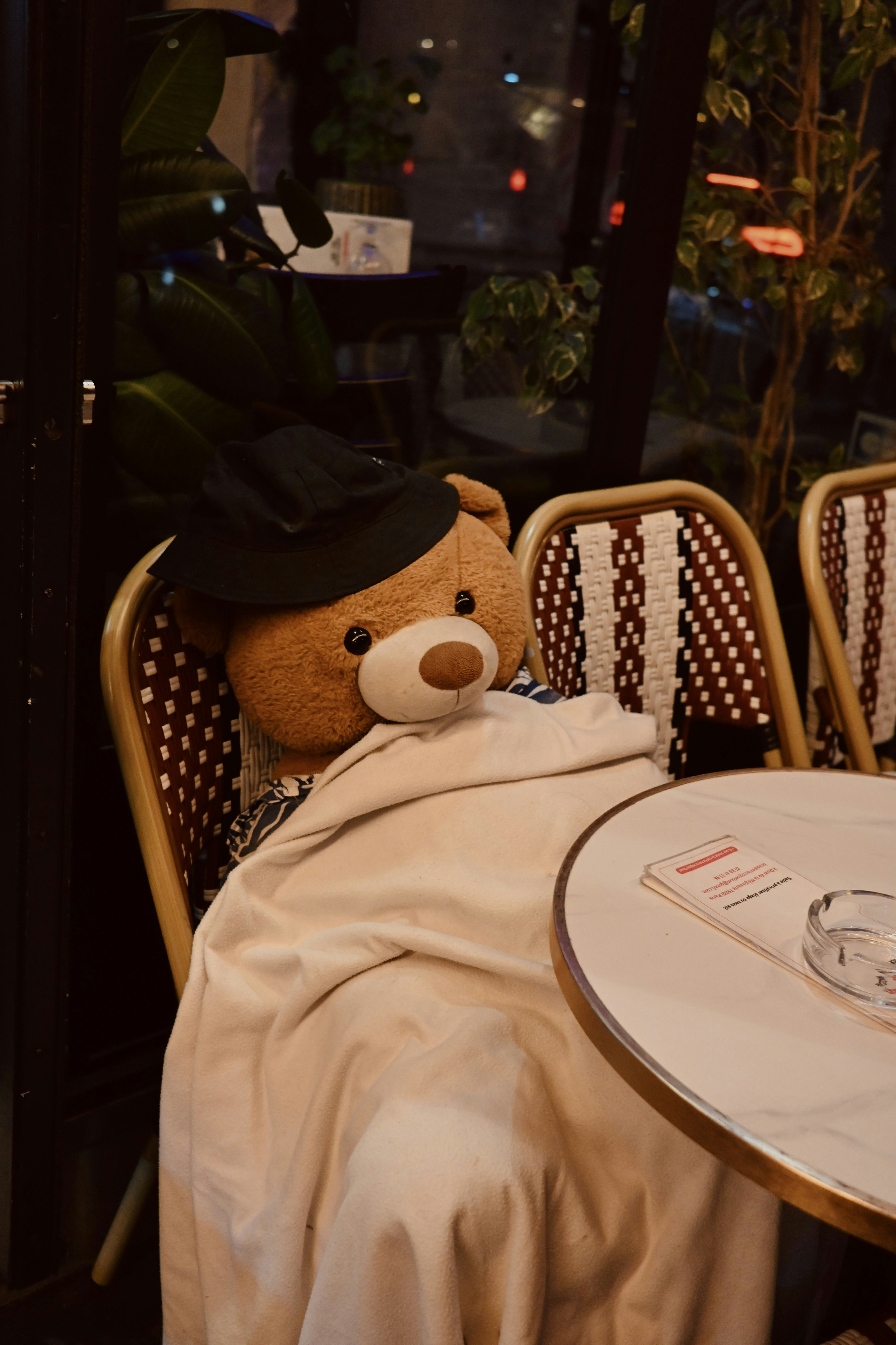 Teddy Bear in the Cafe with a Night-Cafe Atmosphere