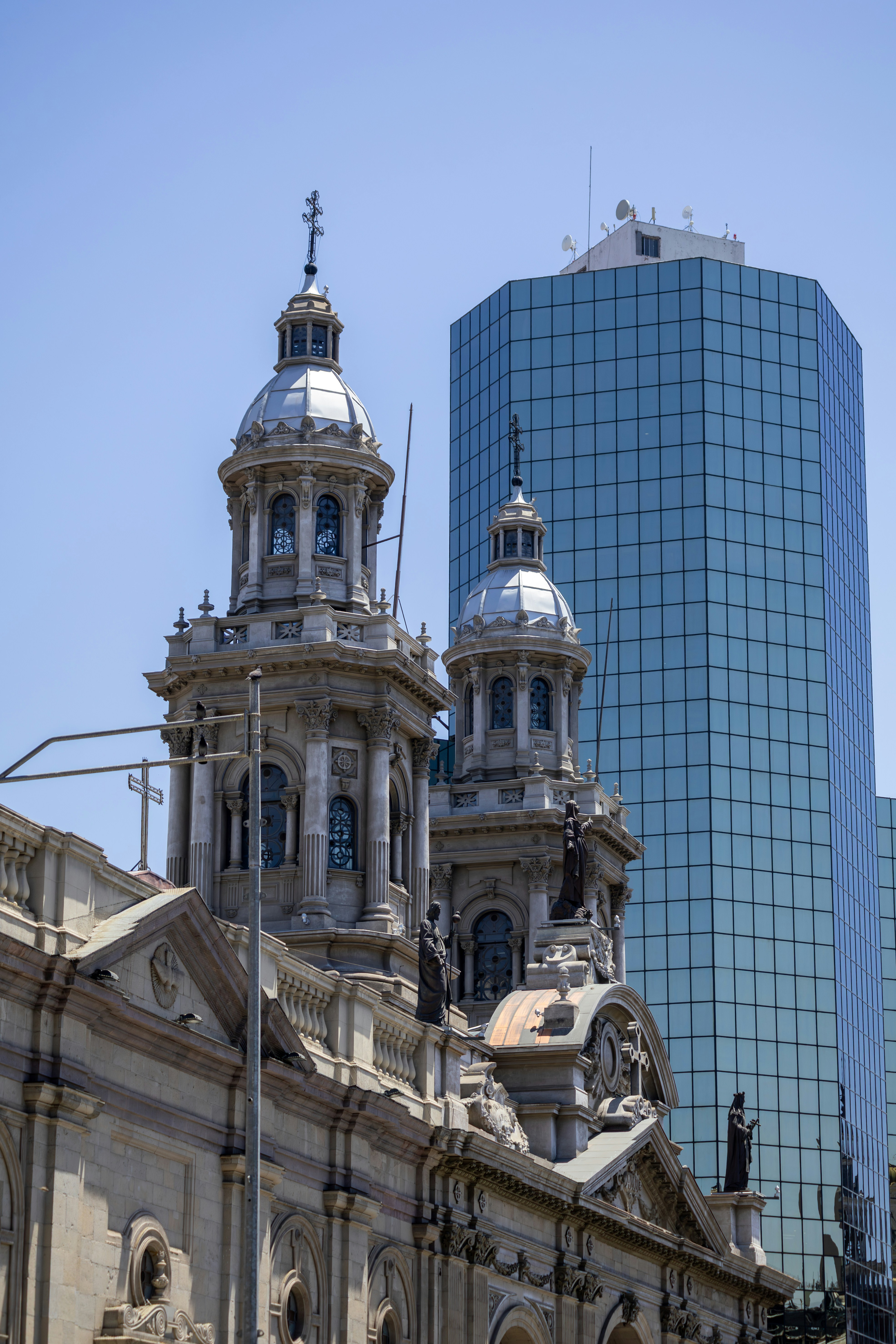 Stone Towers Meet Glass Sky: A City Duo