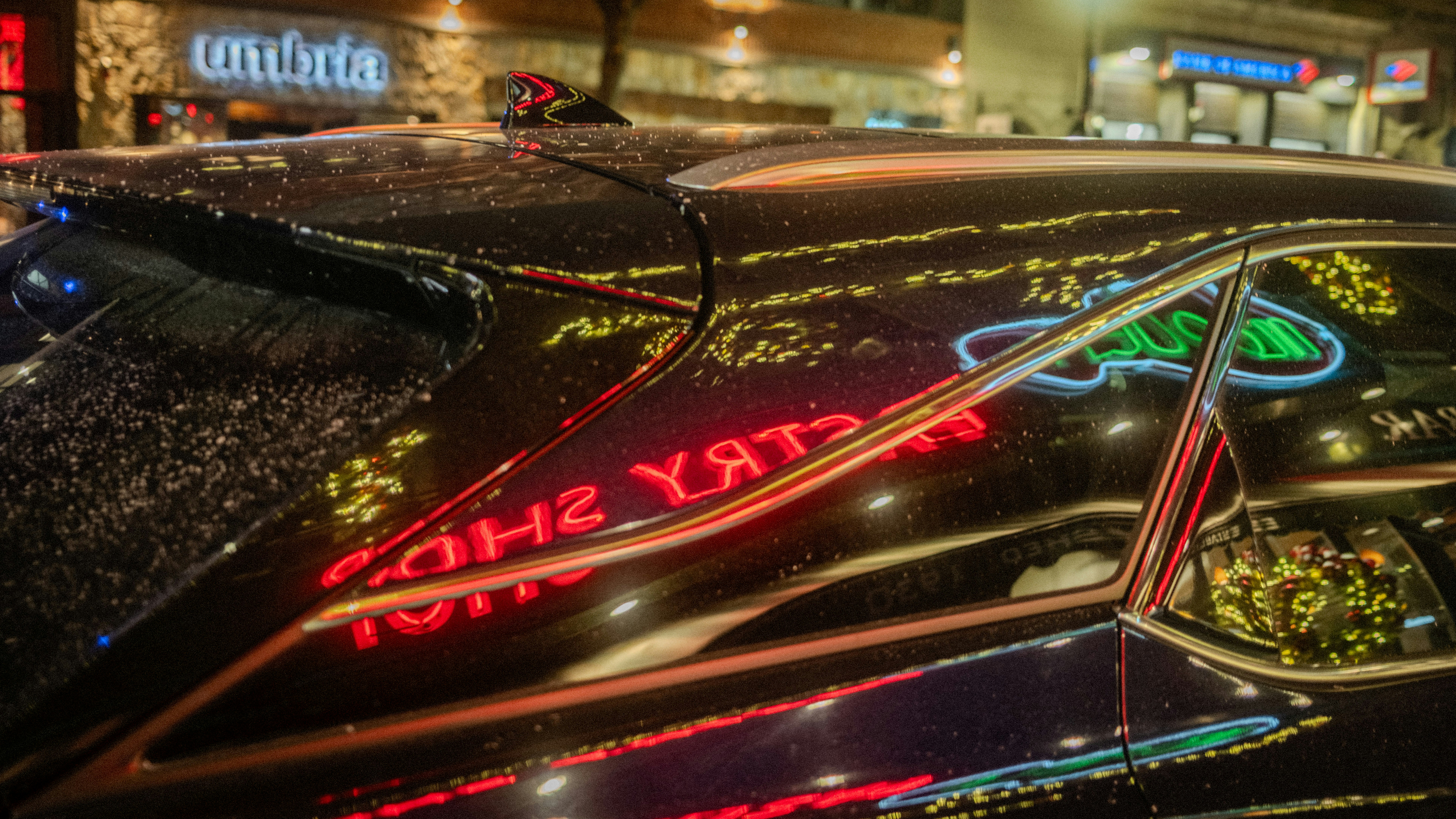 Neon Reflections on a Closed Night