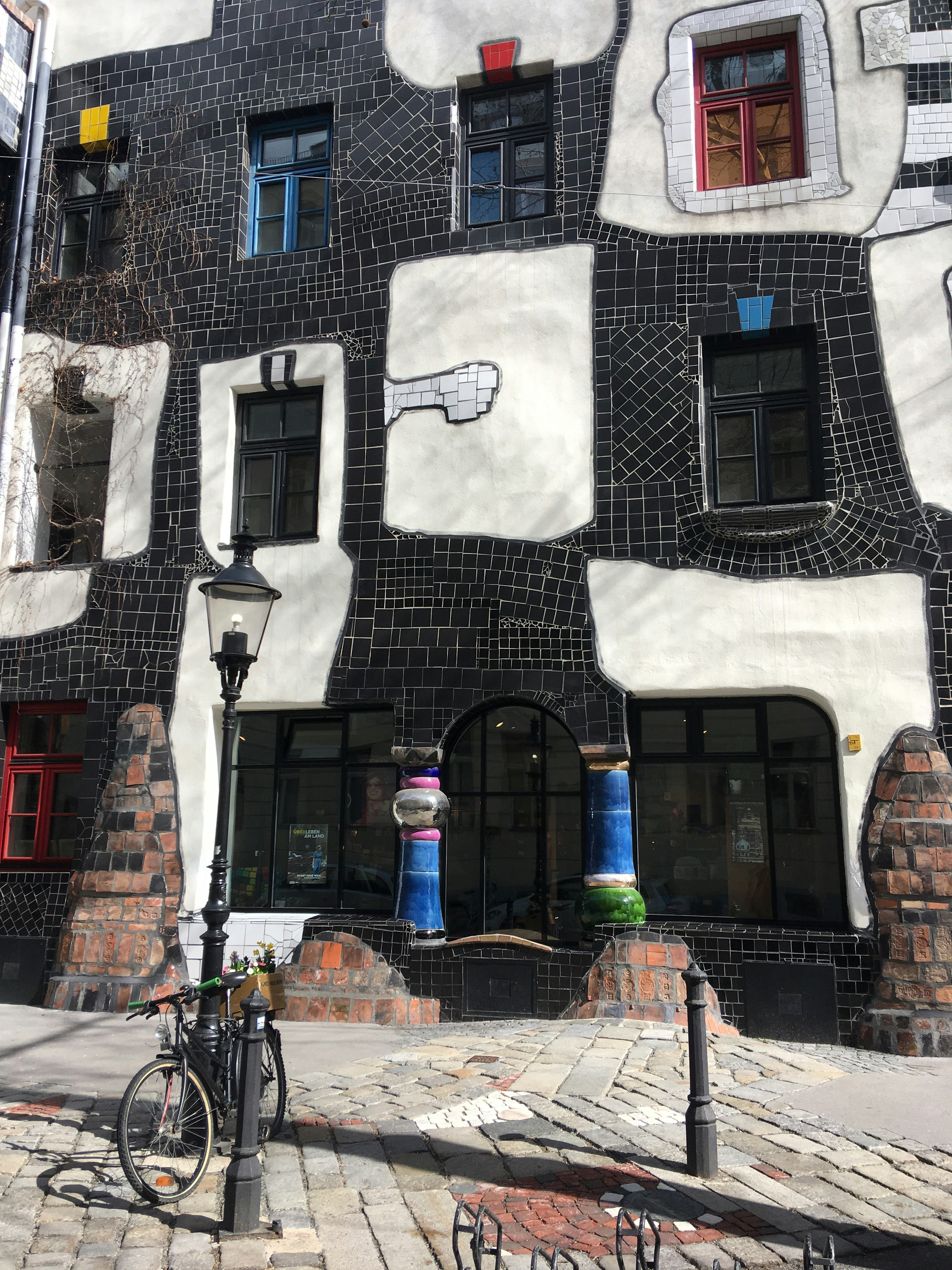 Whimsical Facade: A Cobblestone Street Meets Cartoon Brickwork