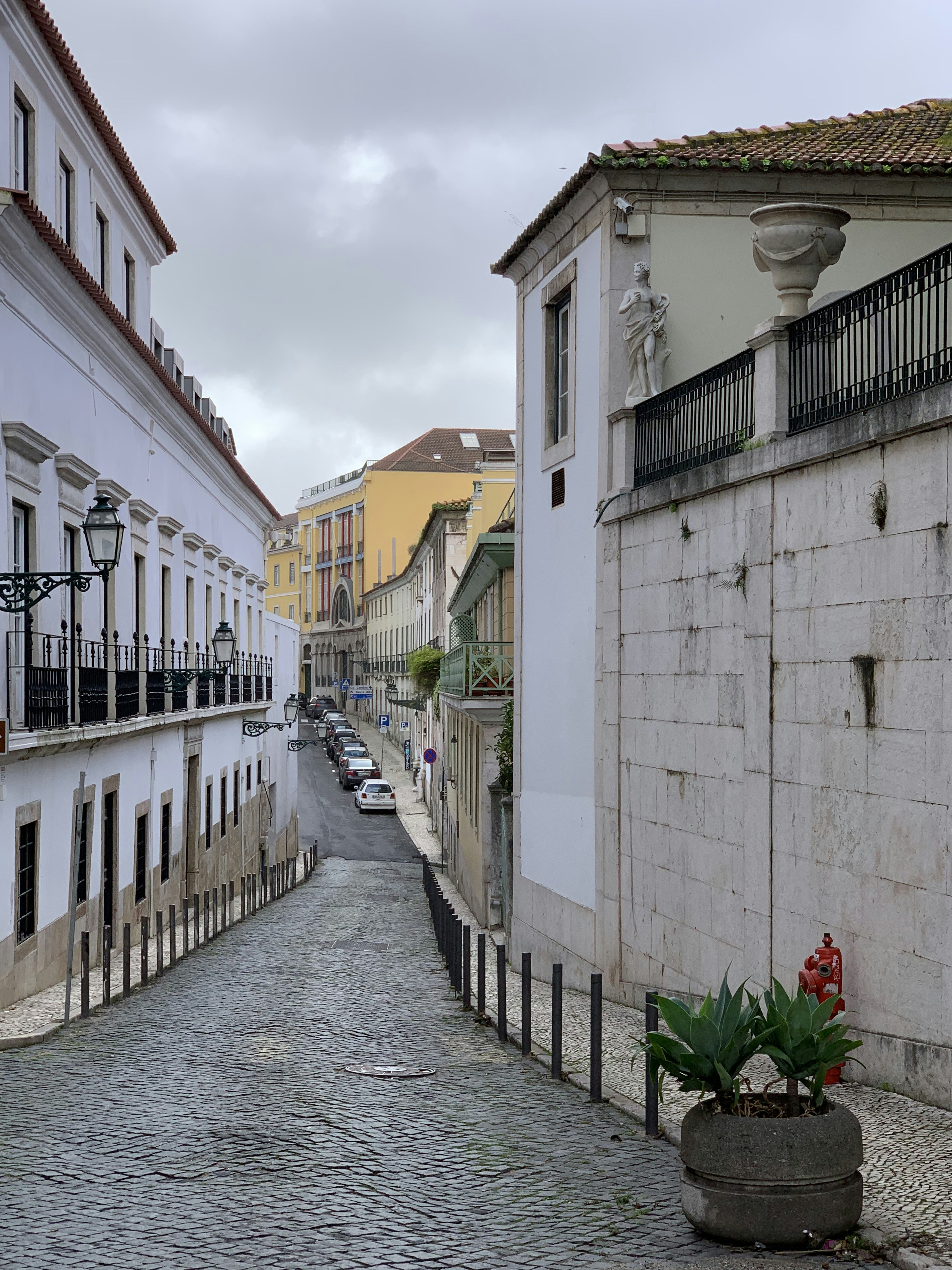 Cobbled Street Toward a Sunlit Calle