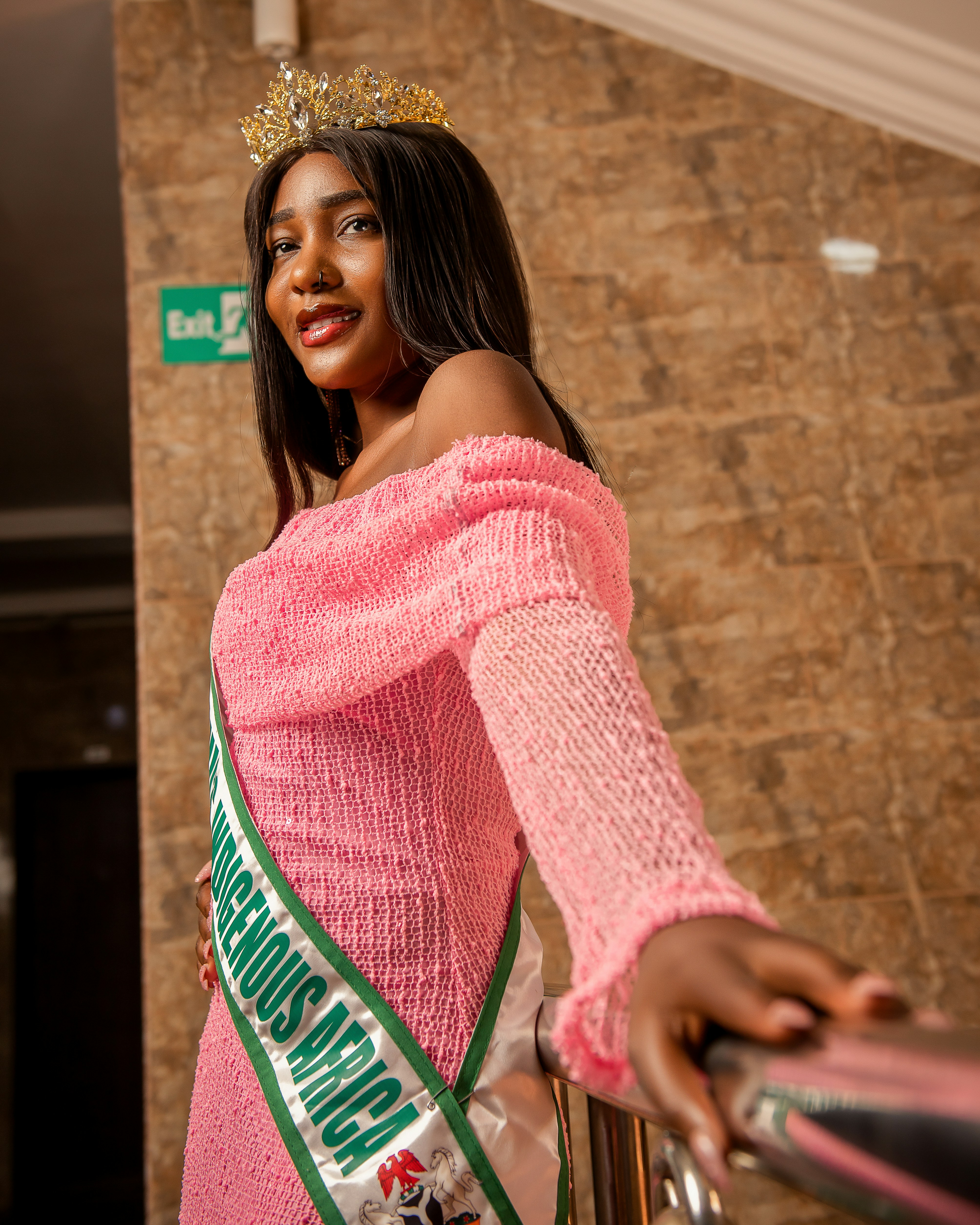 A woman wearing a crown and sash smiles. photo – Free Fashion Image on ...