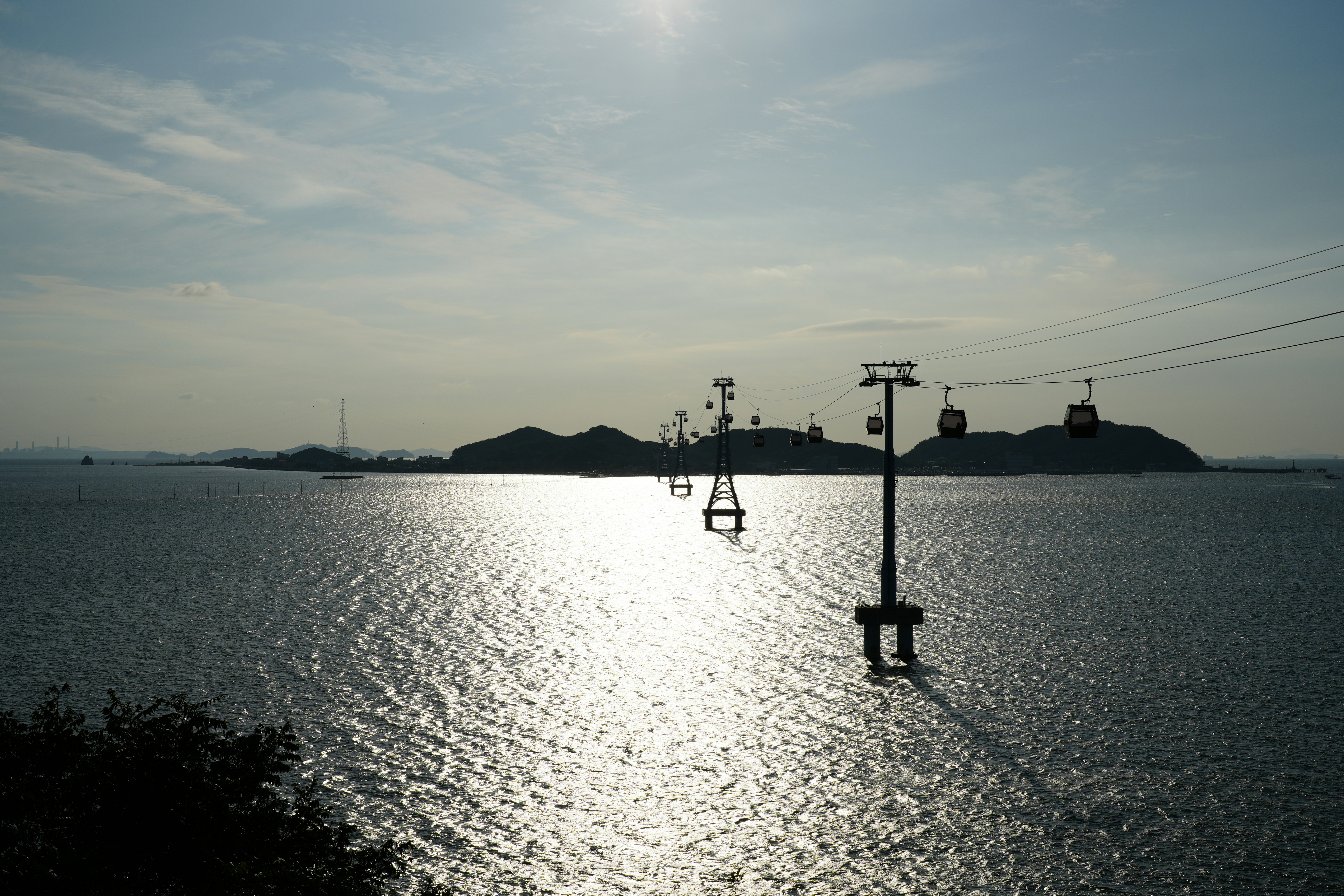Glittering Sea Cable Car Silhouette at Dusk