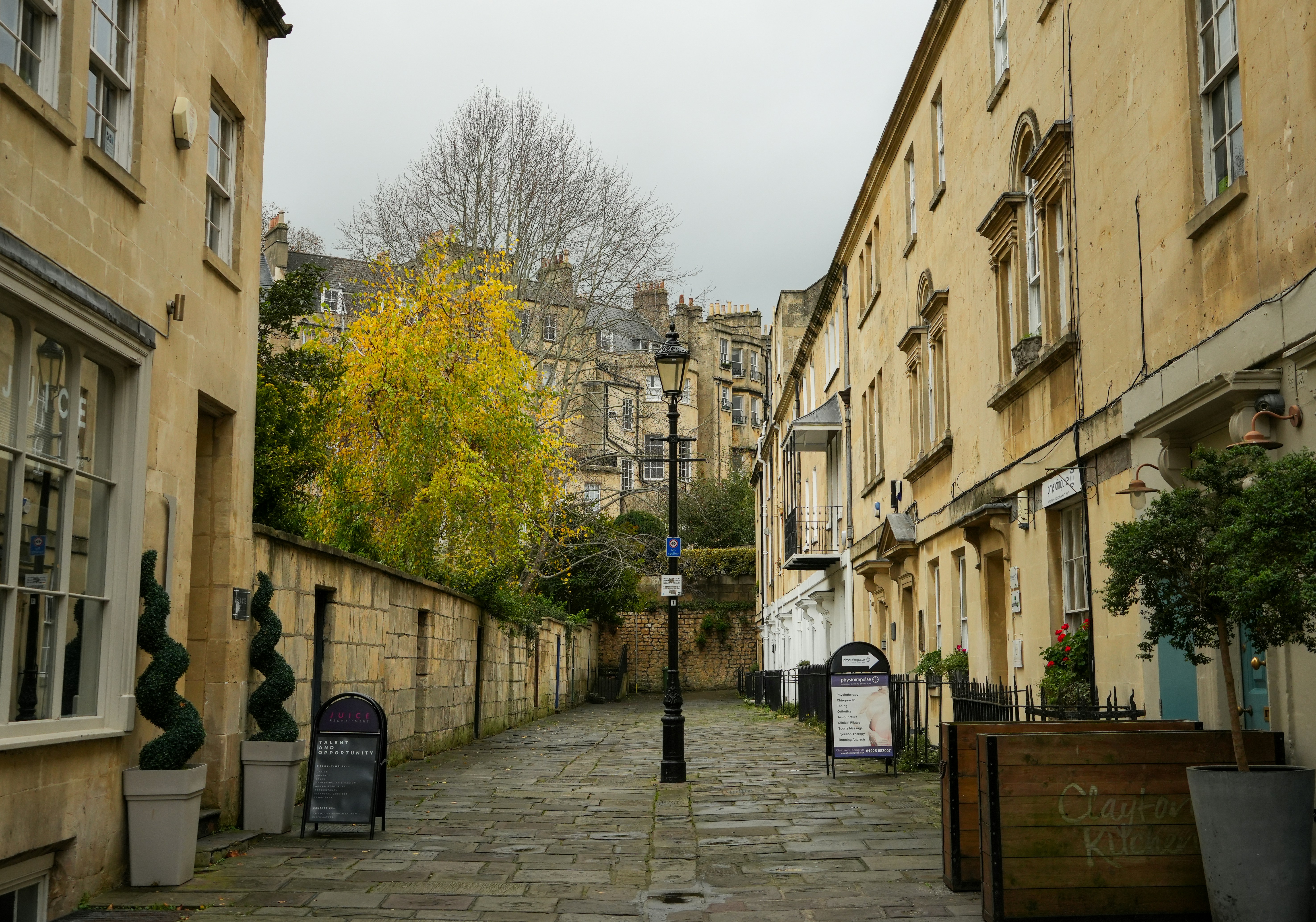 Sunlit Somerset Lane: A Quiet Stone-Paved Passage Between Timeless Townhouses