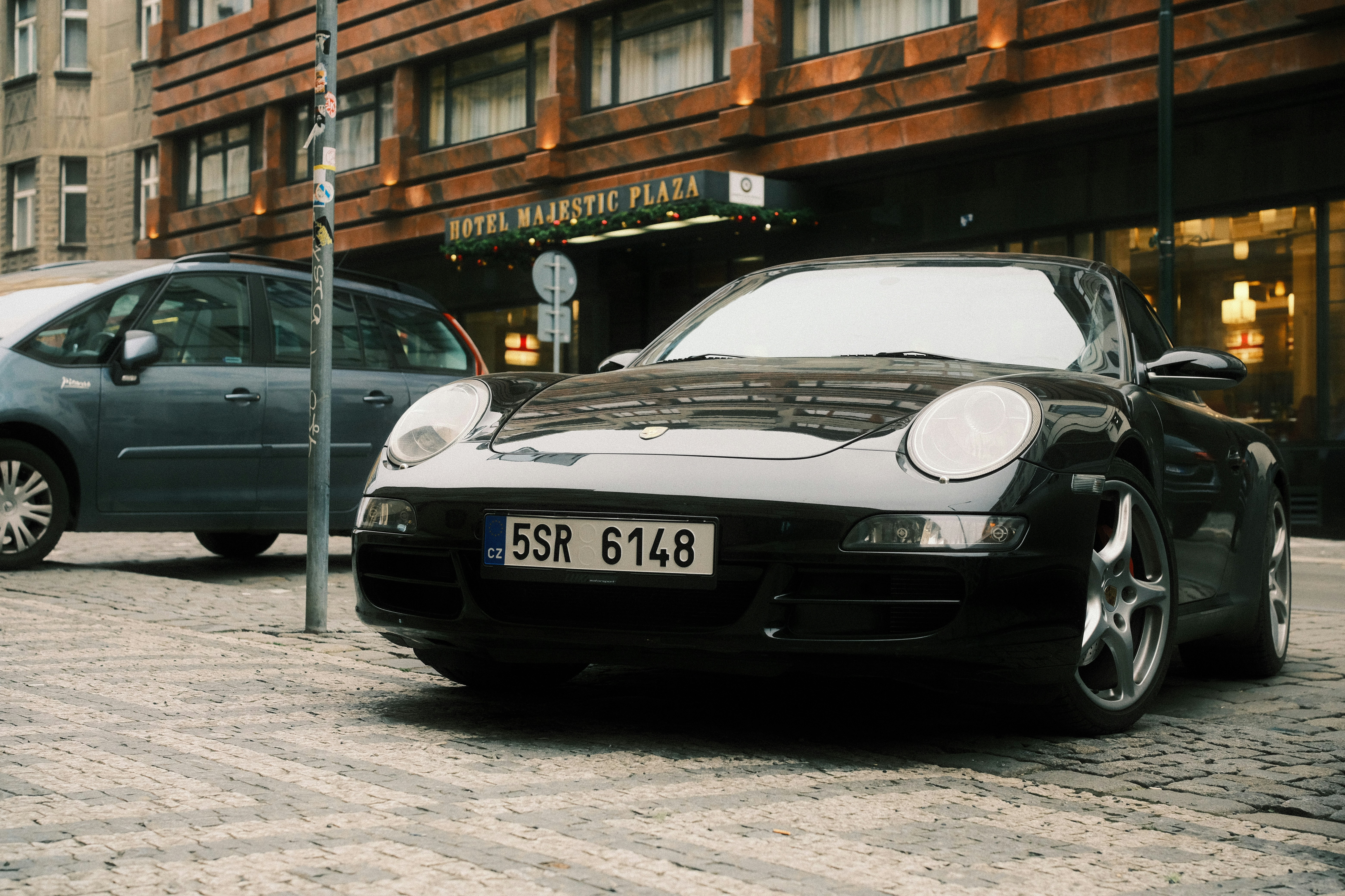 Luxury Convertible on Cobblestones by the City Hotel