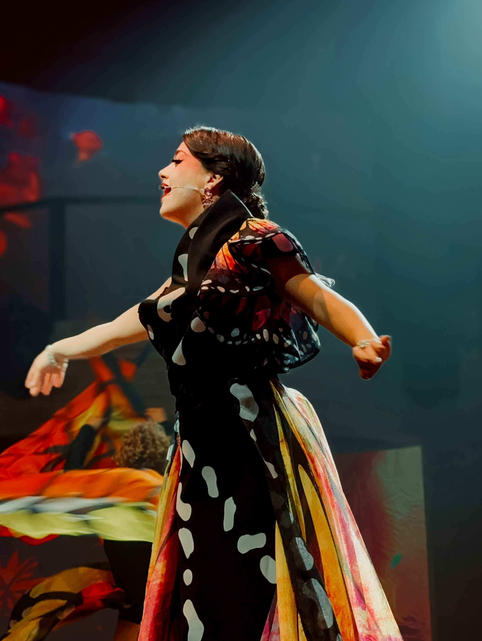 Grace in Motion: A Flamenco-infused Dance Under Stage Light