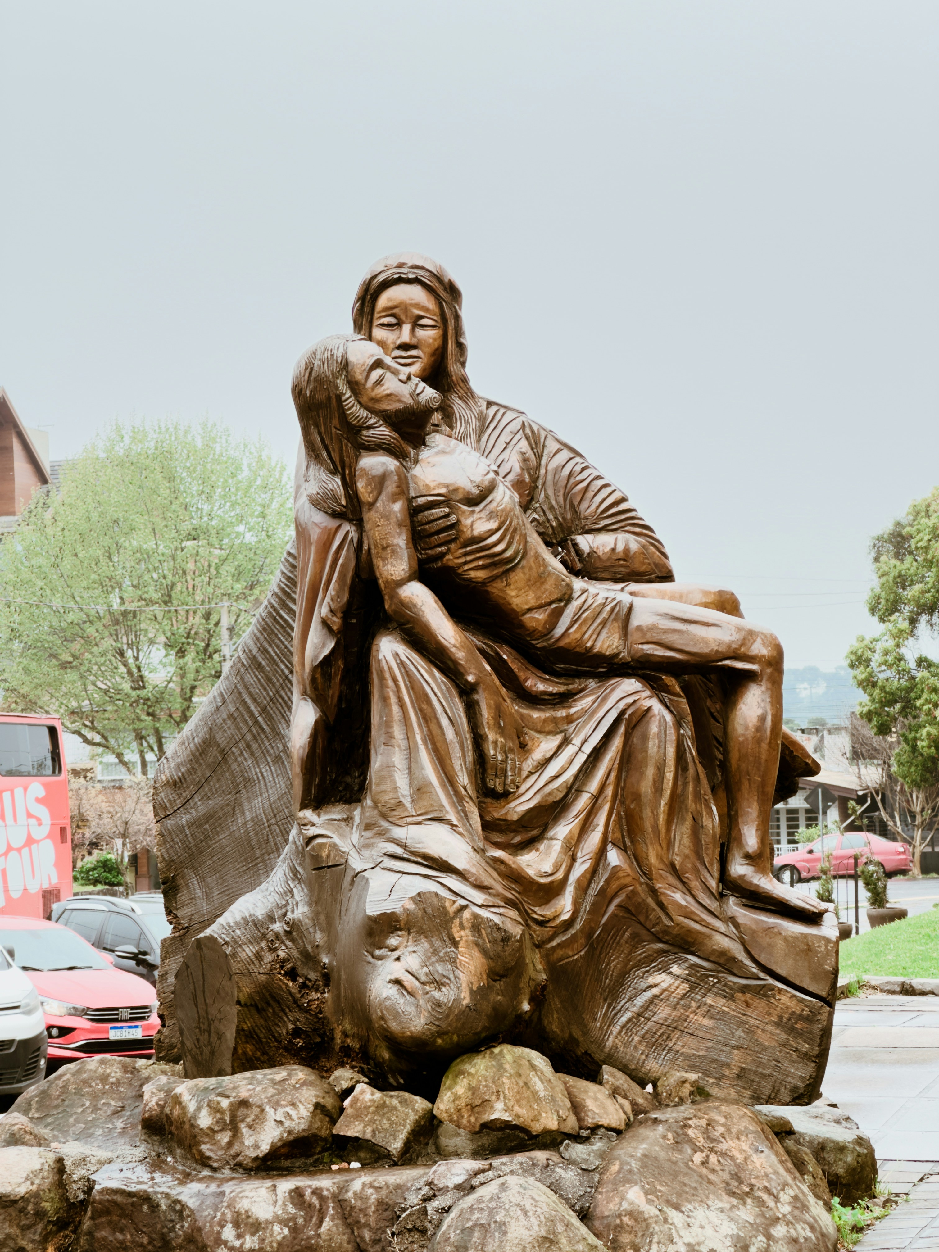 Statue of Mother and Child Anchored by Moonlit Rock