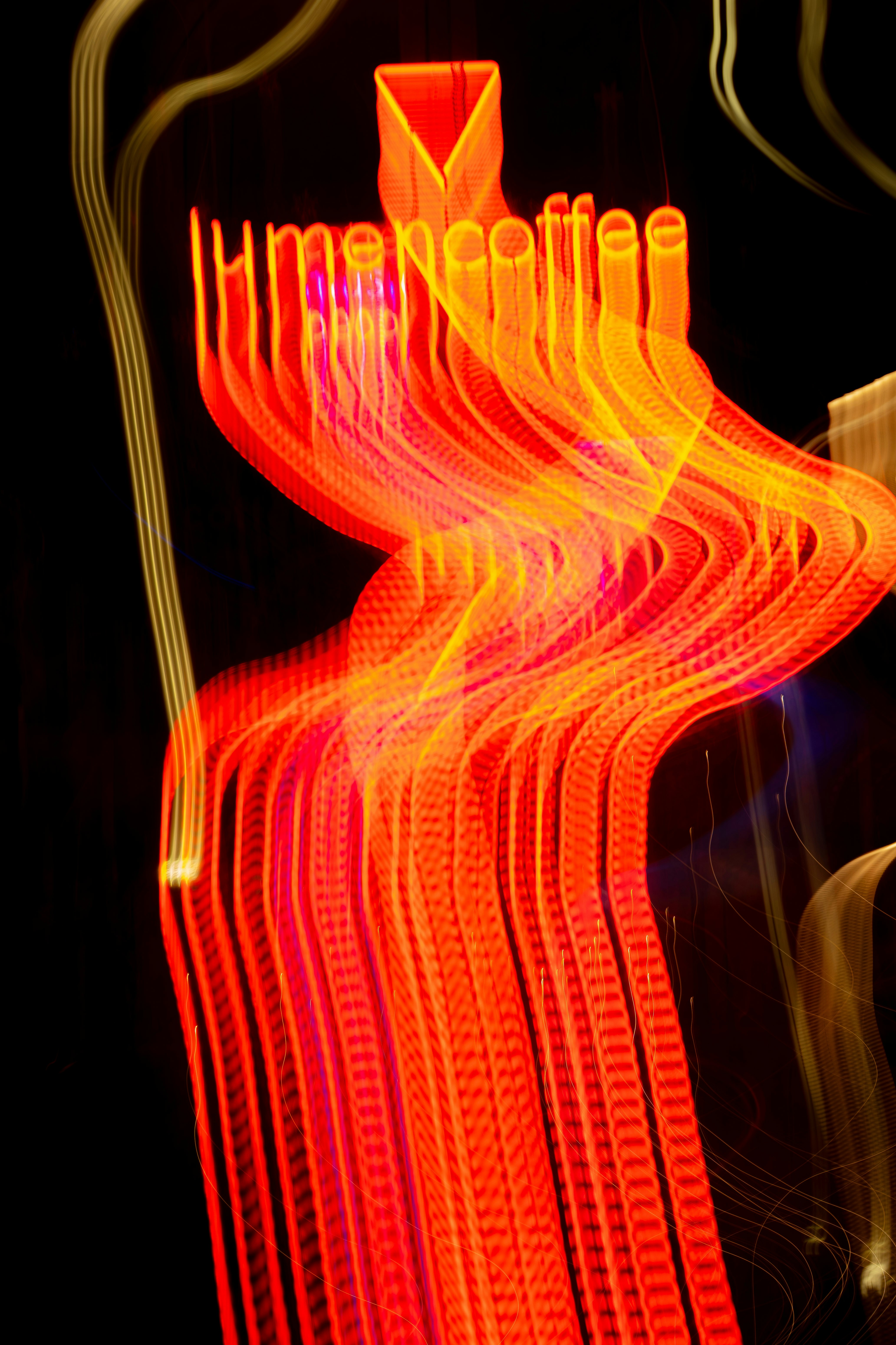 Neon Ribbon: Luminous Signage in Motion