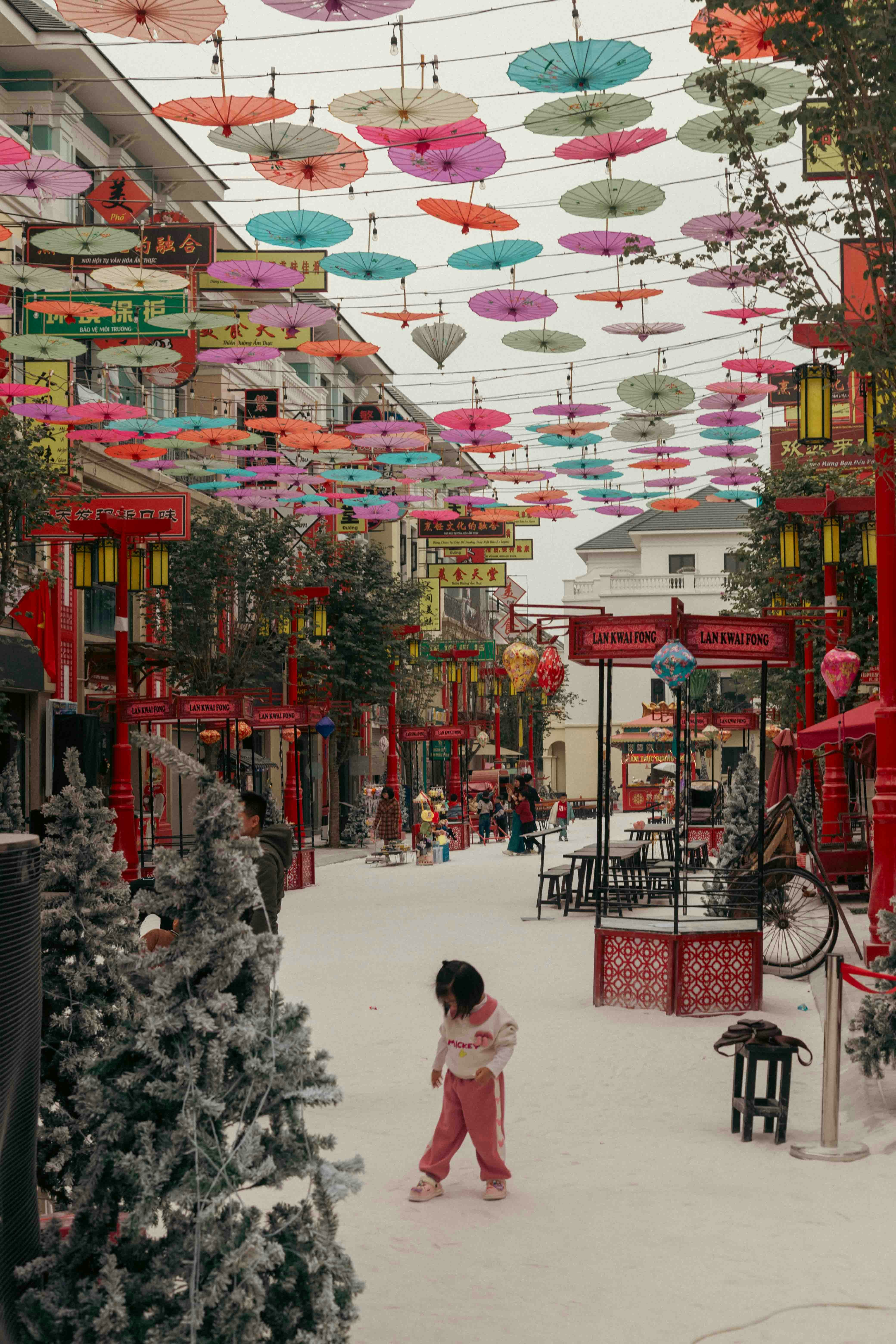 Floating Lanterns Over a Snow-Dusted Street Bazaar