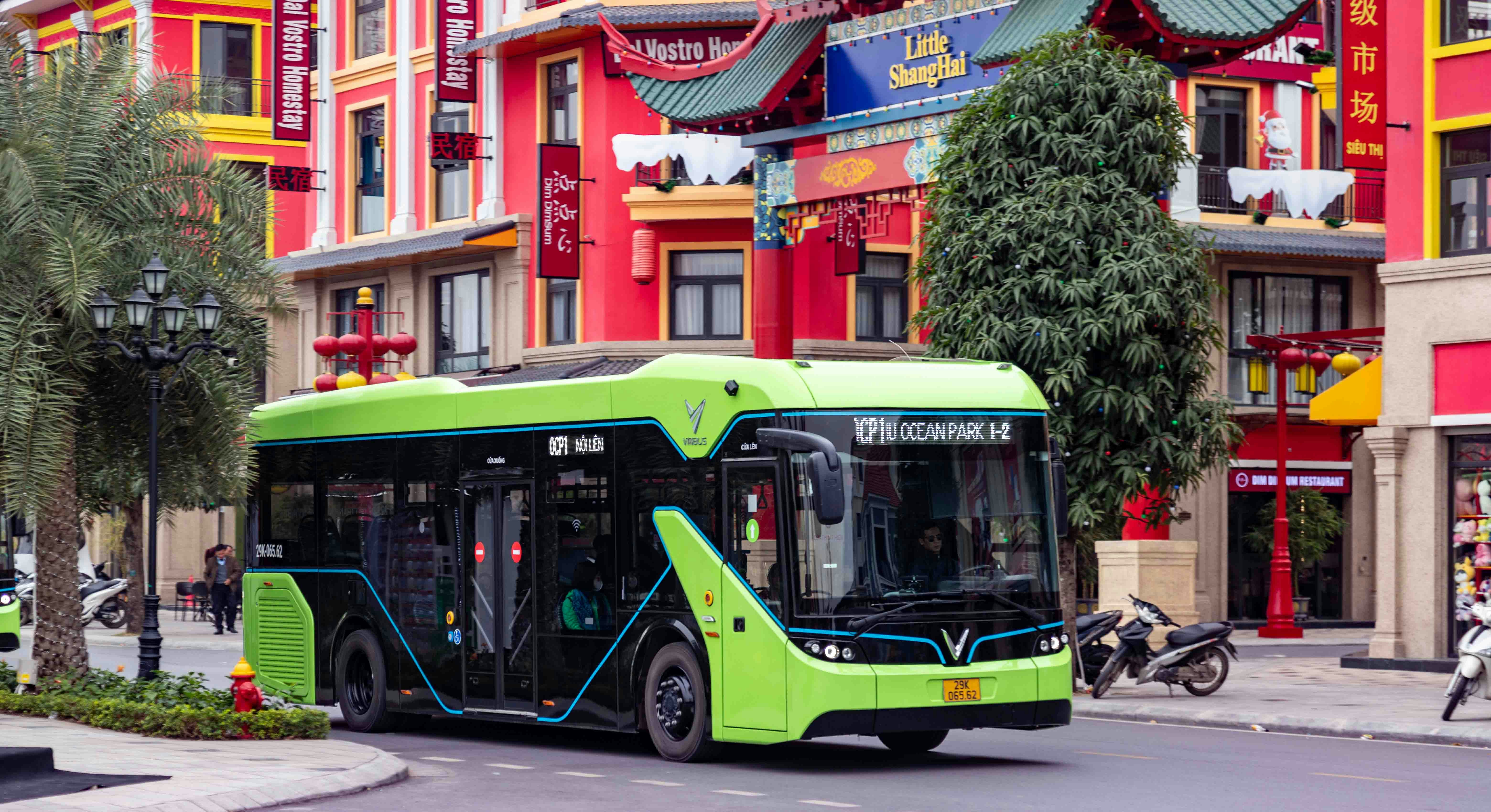 Green Urban Bus at a Colorful Shanghainese-Style Street