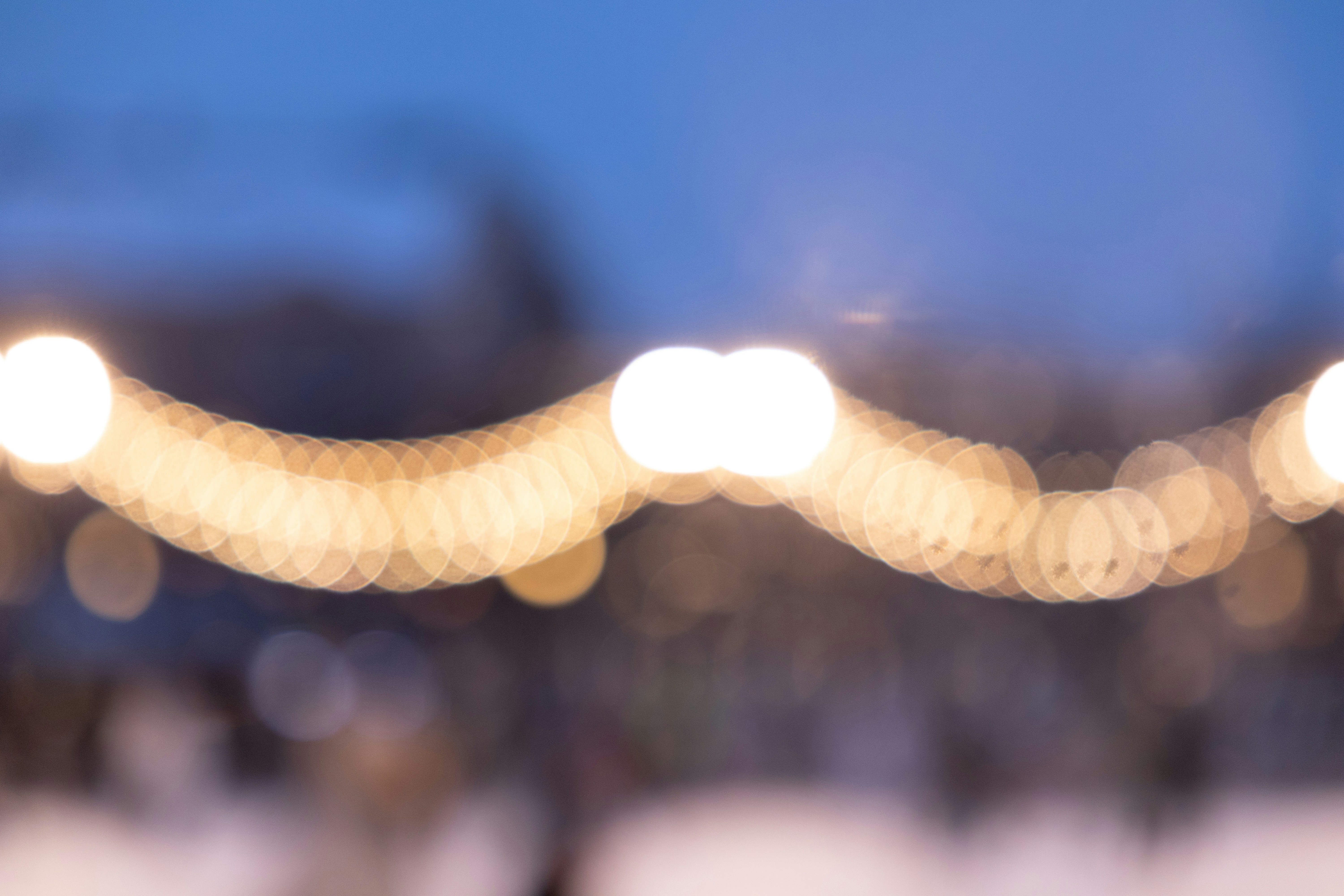 Soft Bistro Lights: Bokeh in Evening Blur