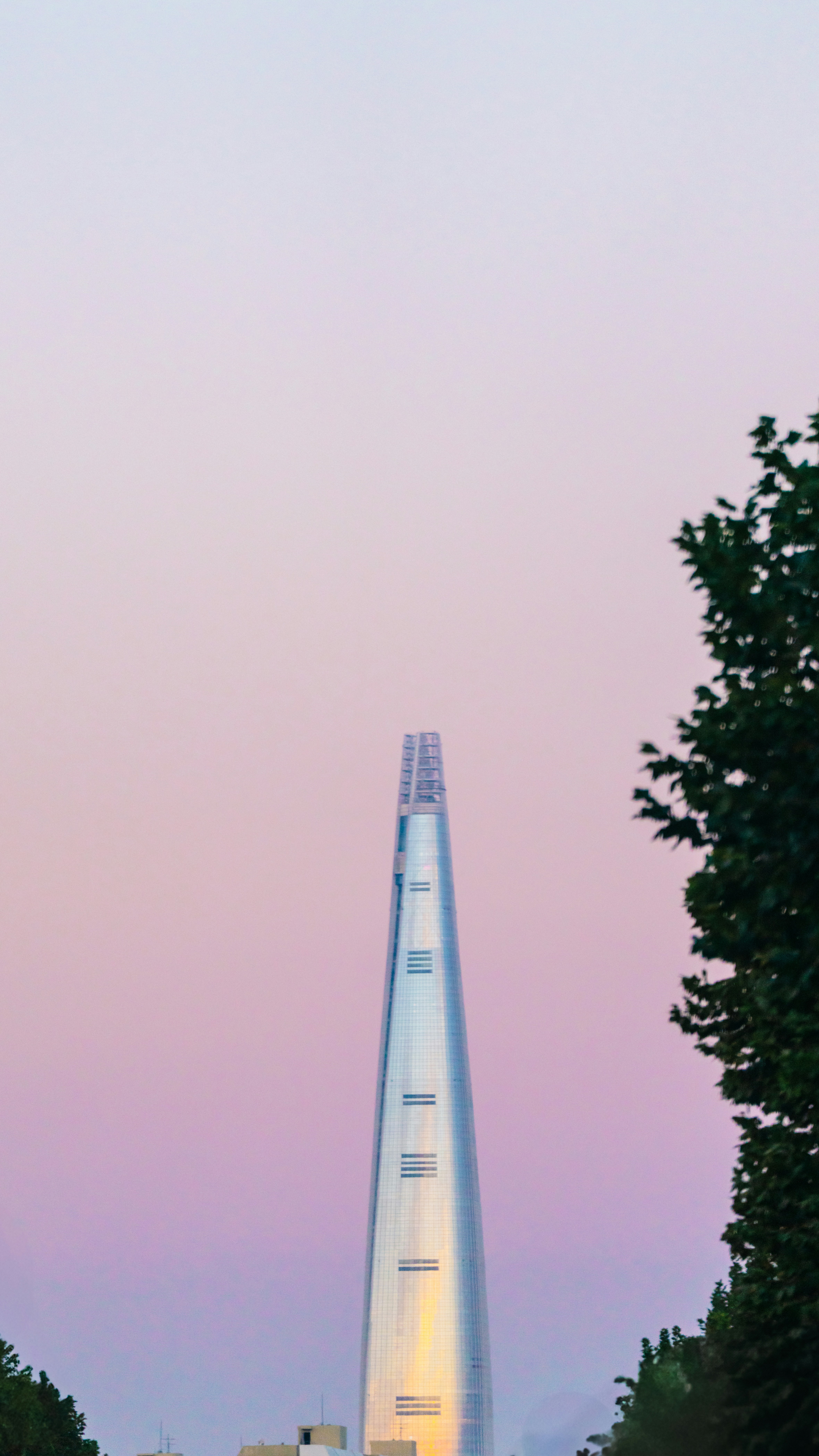 Skyward Needle: The Shaped Silhouette of a Tower at Dusk