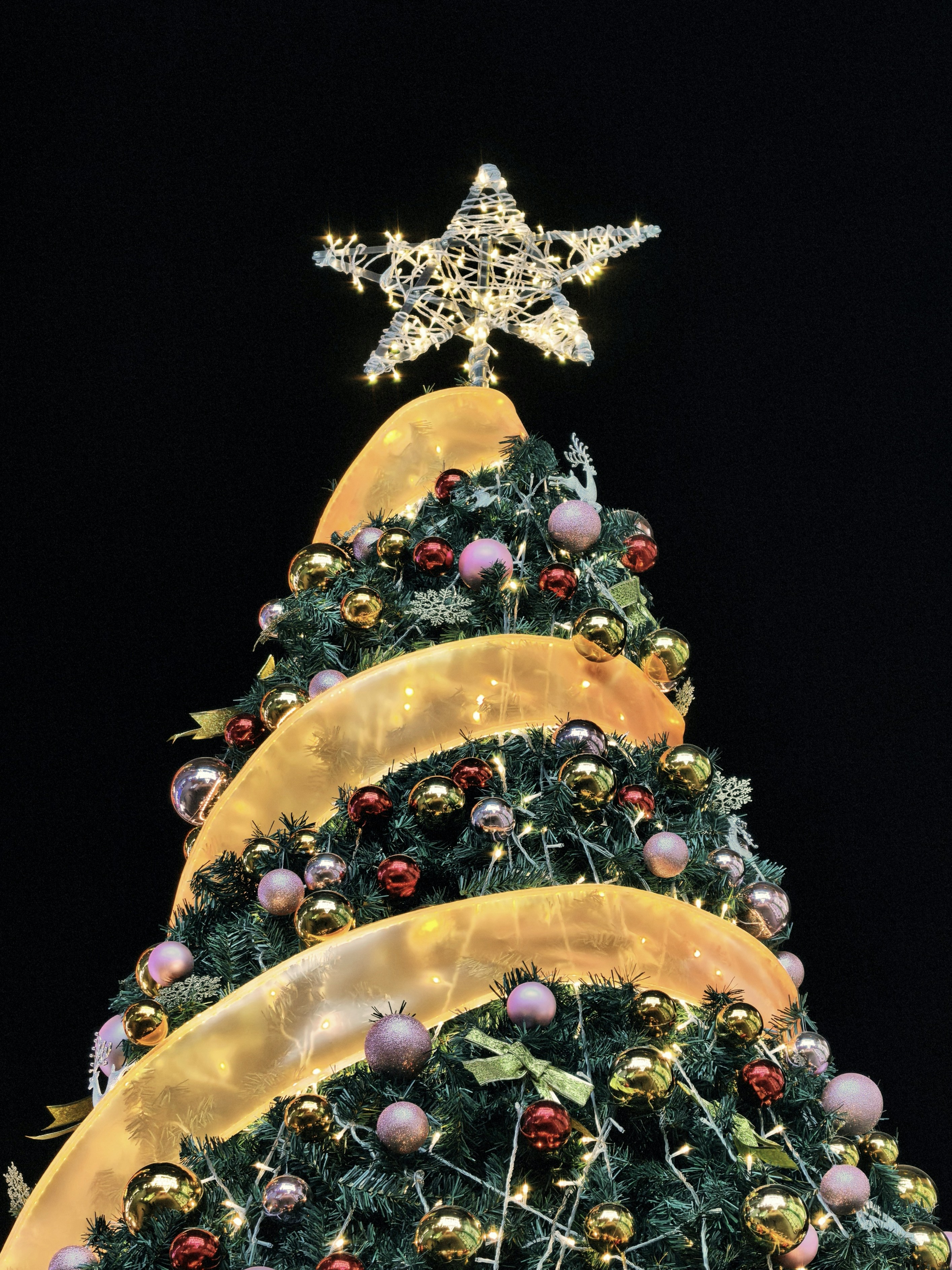 Decorated christmas tree with star on top