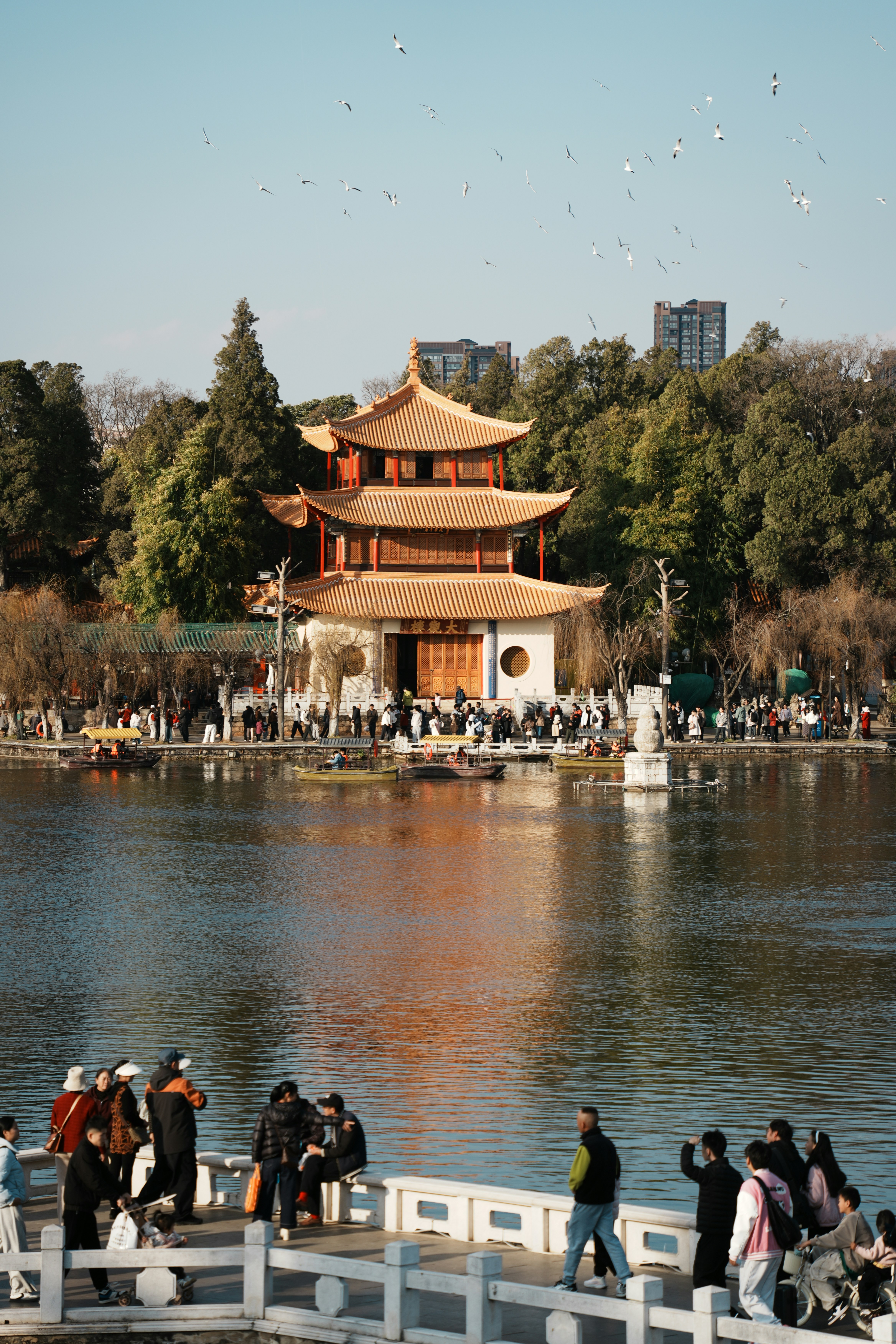 Red Pagoda Reverberating Over Calm Waters