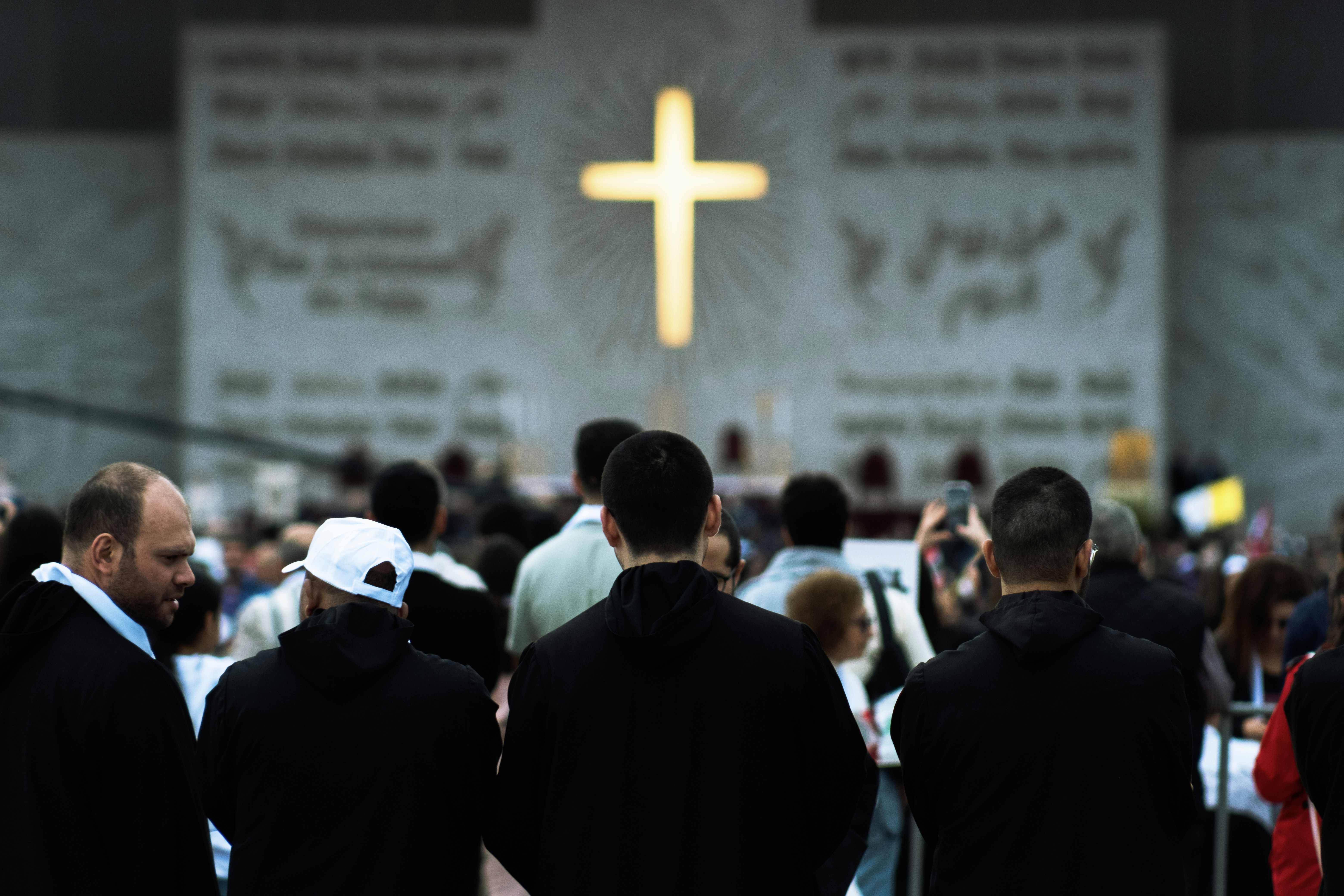 Quiet Resolve Beneath the Neon Cross