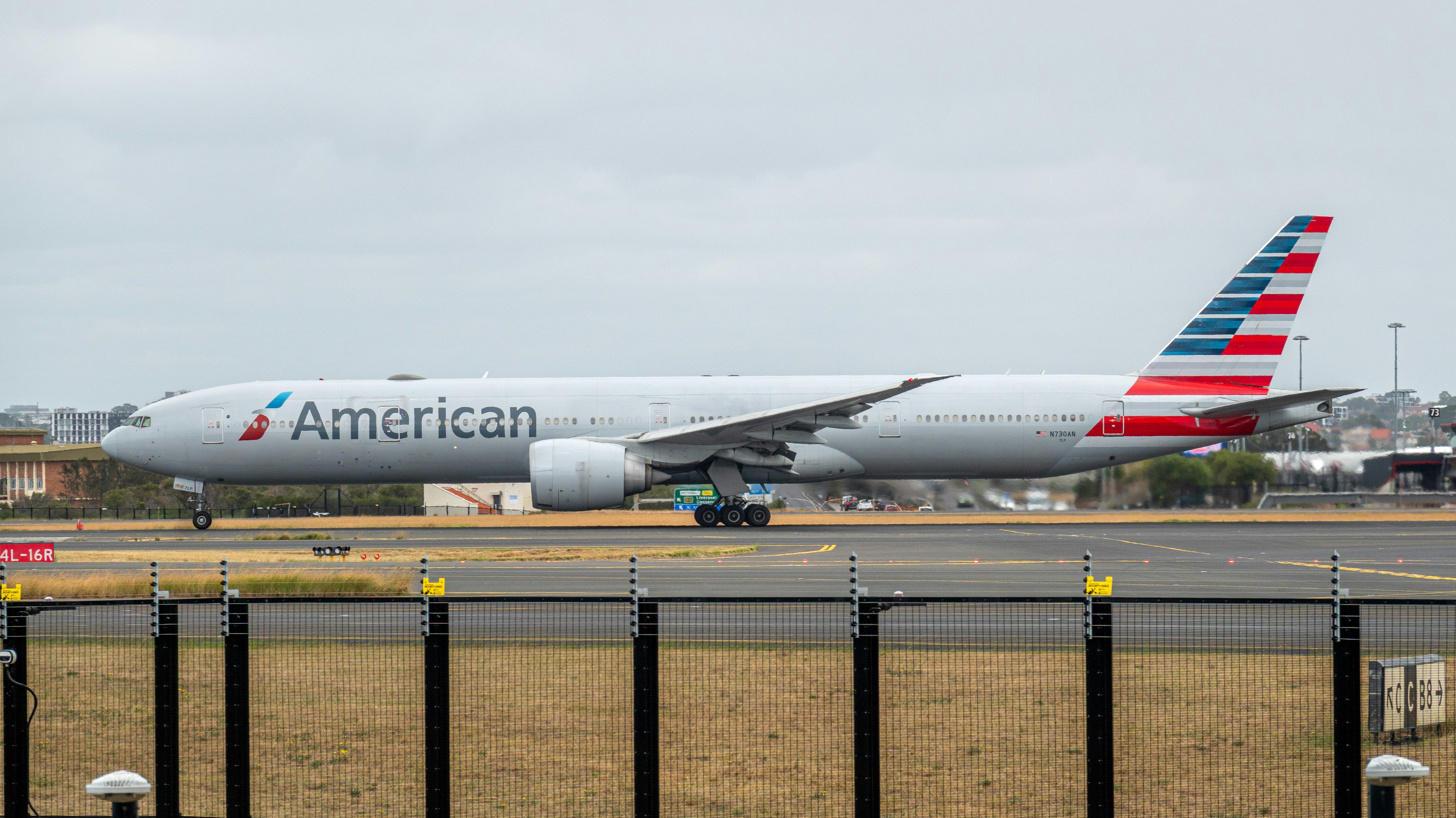 American Jet on the Tarmac: Calm Lined Up at the Gate