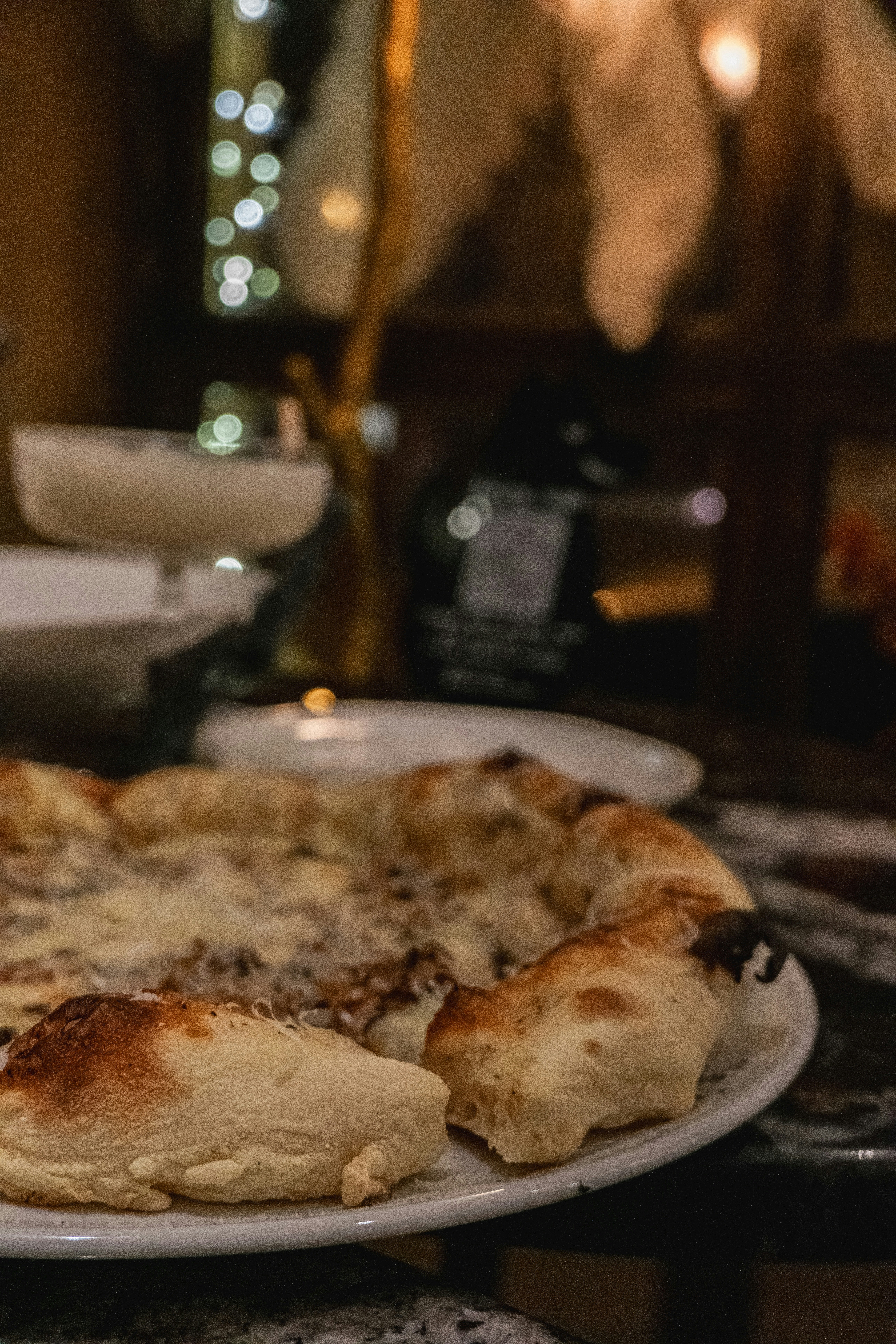 Cheesy Slice at Dusk: A Pizza Moment in Warm Lights