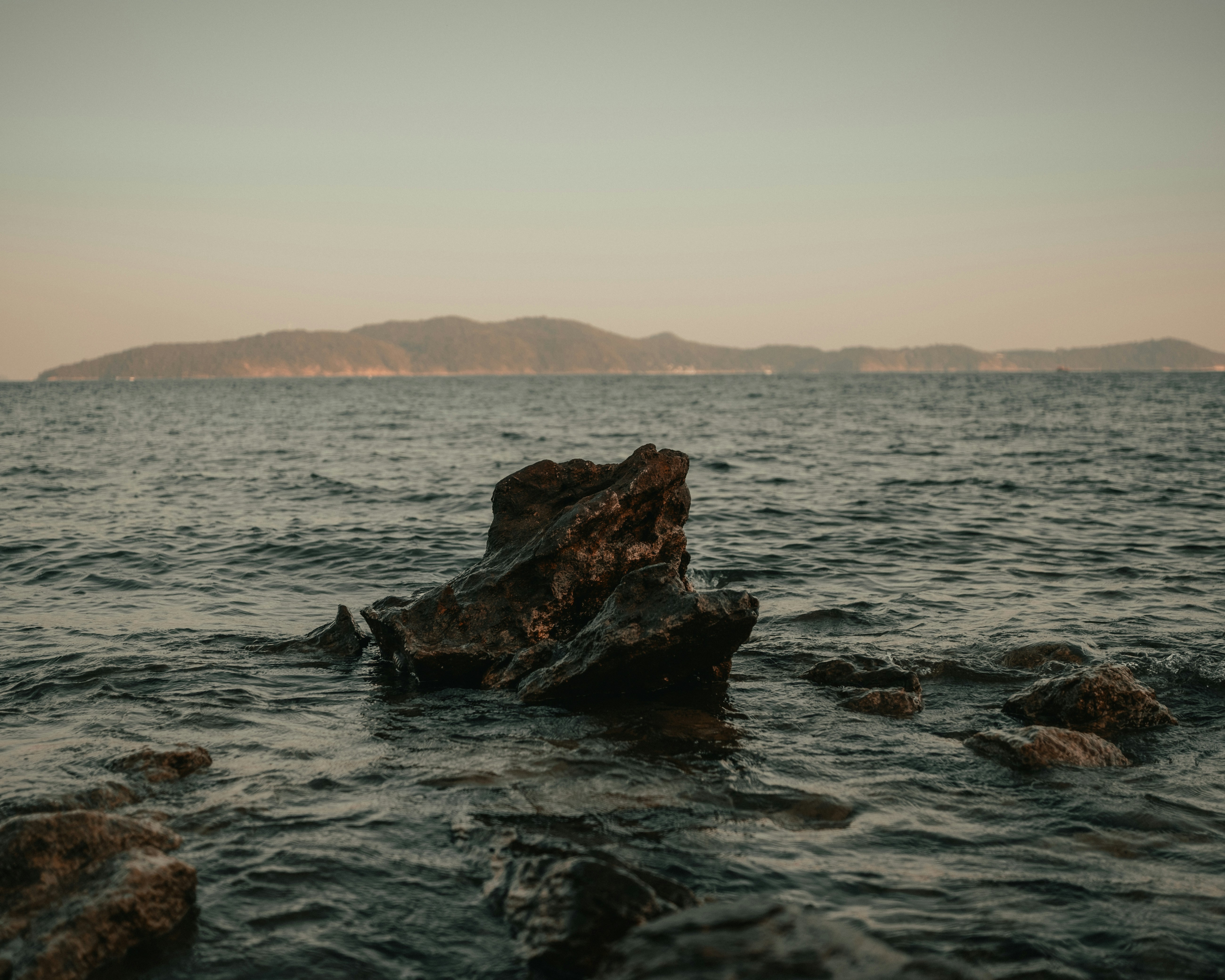 Rugged Sea Stack Against a Quiet Horizon