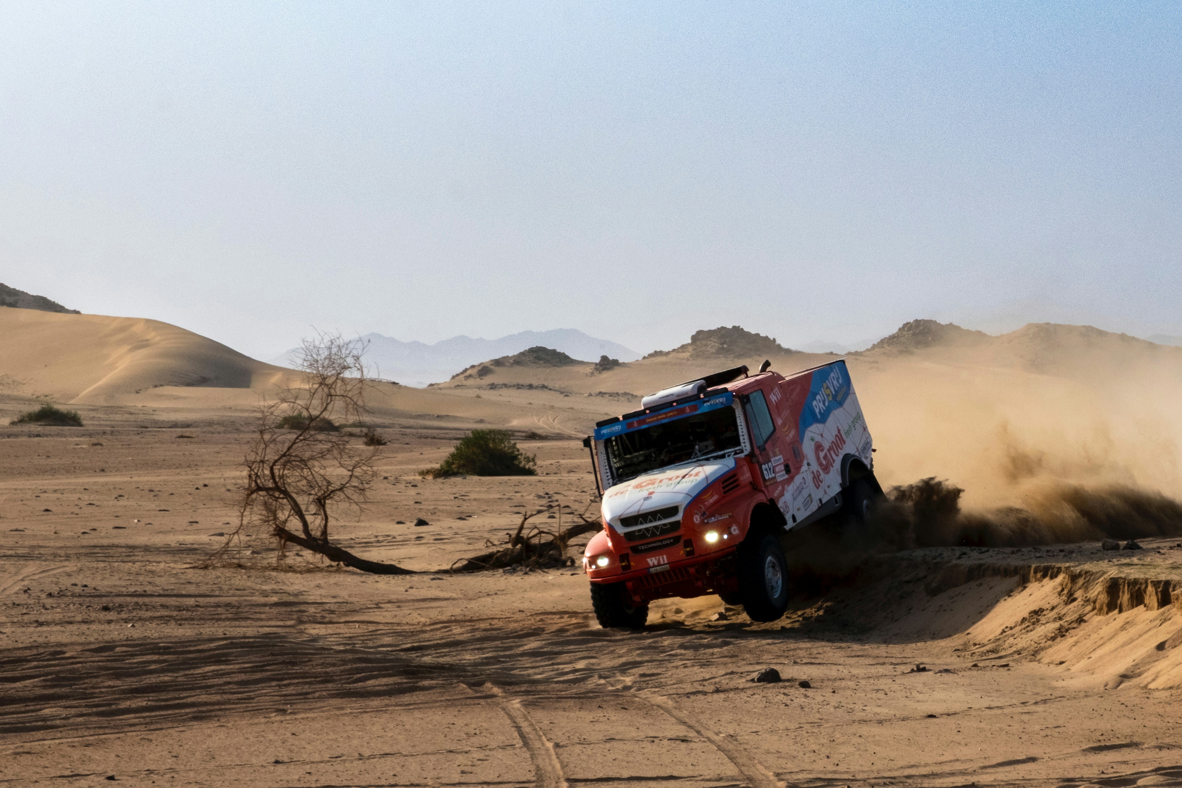 Desert Rally: Dusty Leap of a Race Truck