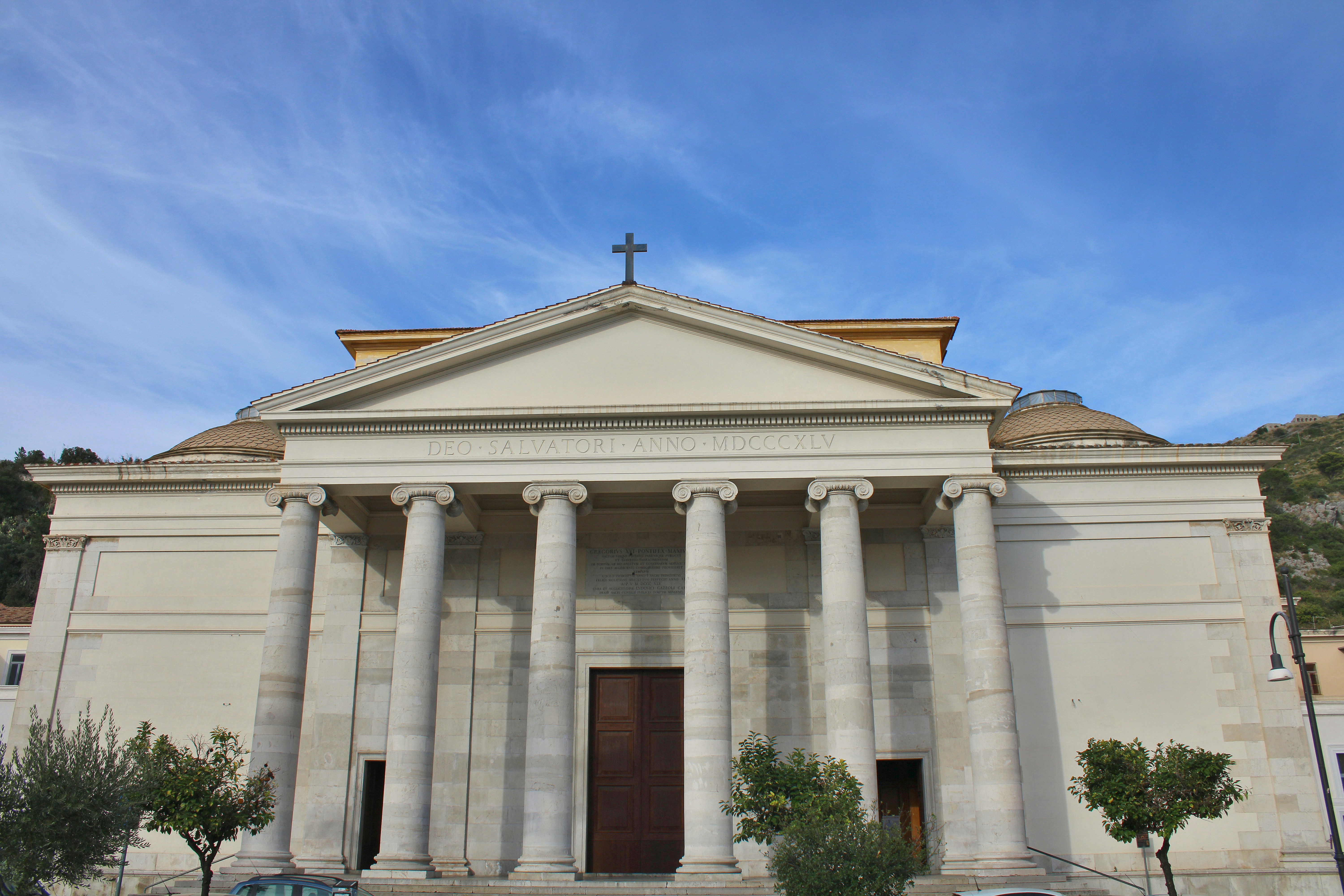Temple of Columns Under a Blue Sky: Classical Harmony in Stone
