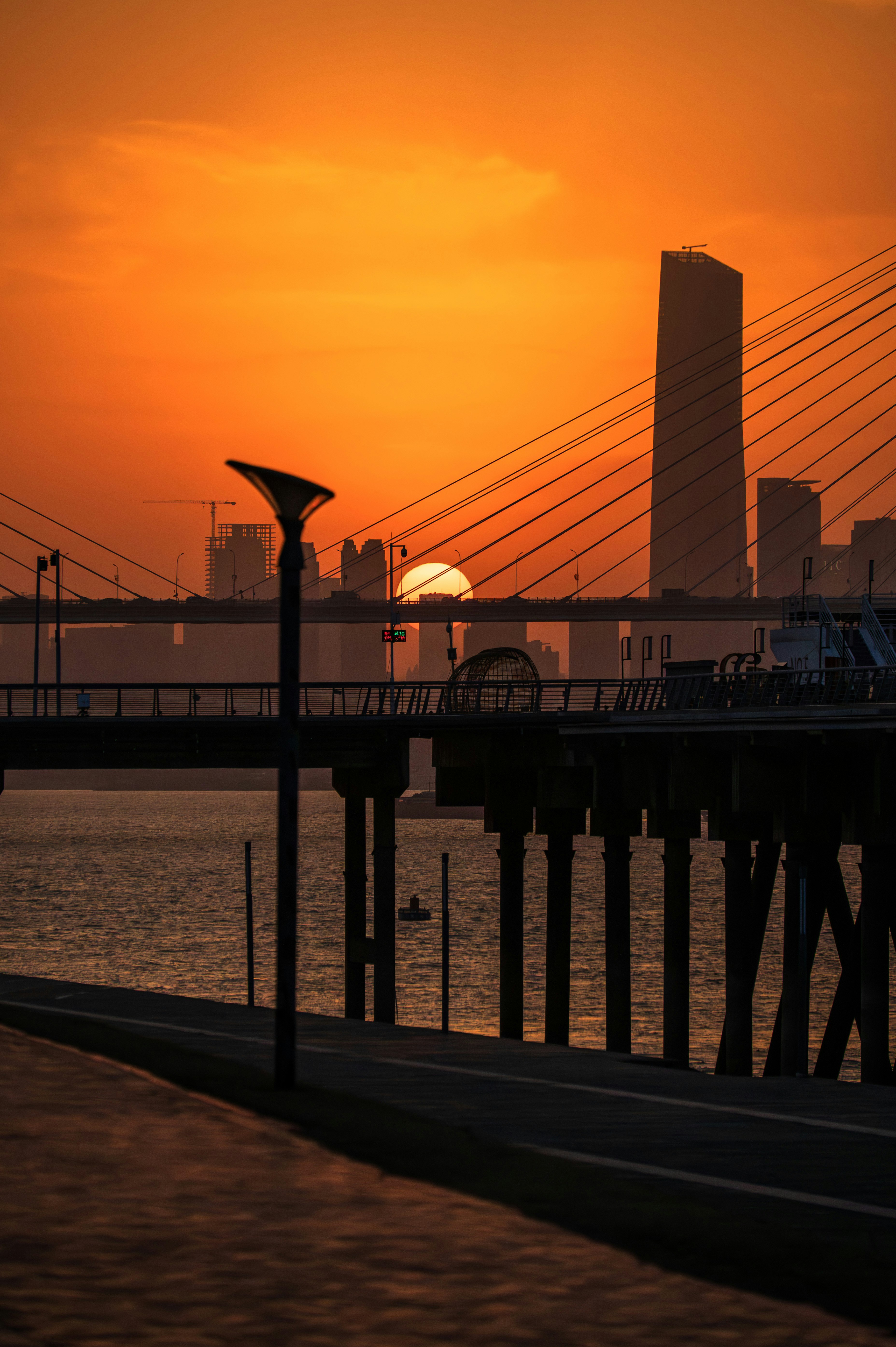 Sunset Over the Pier: An Urban Silhouette