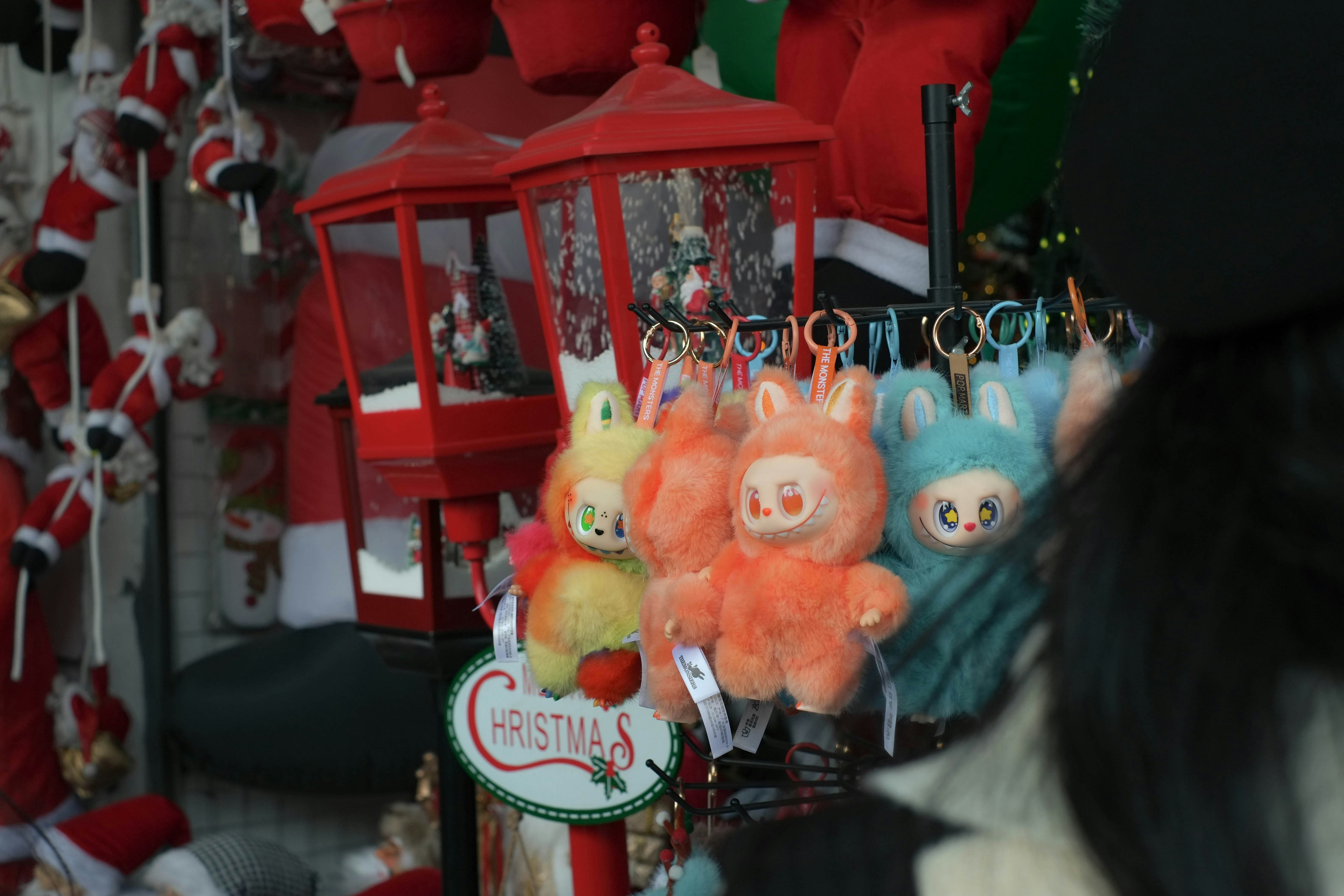 Lively Plush Charms at a Christmas Market Stall