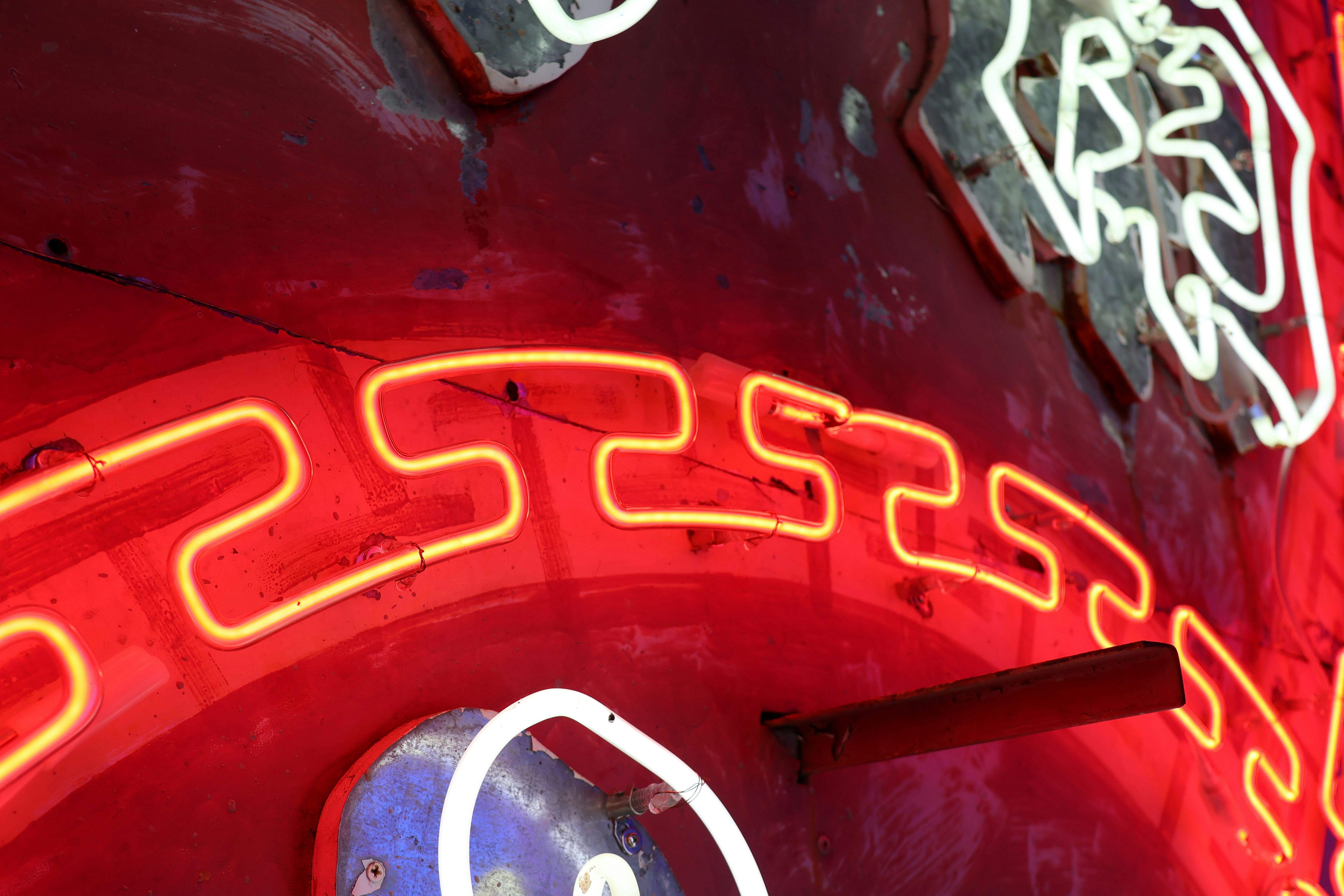 Neon Arc on a Crimson Surface