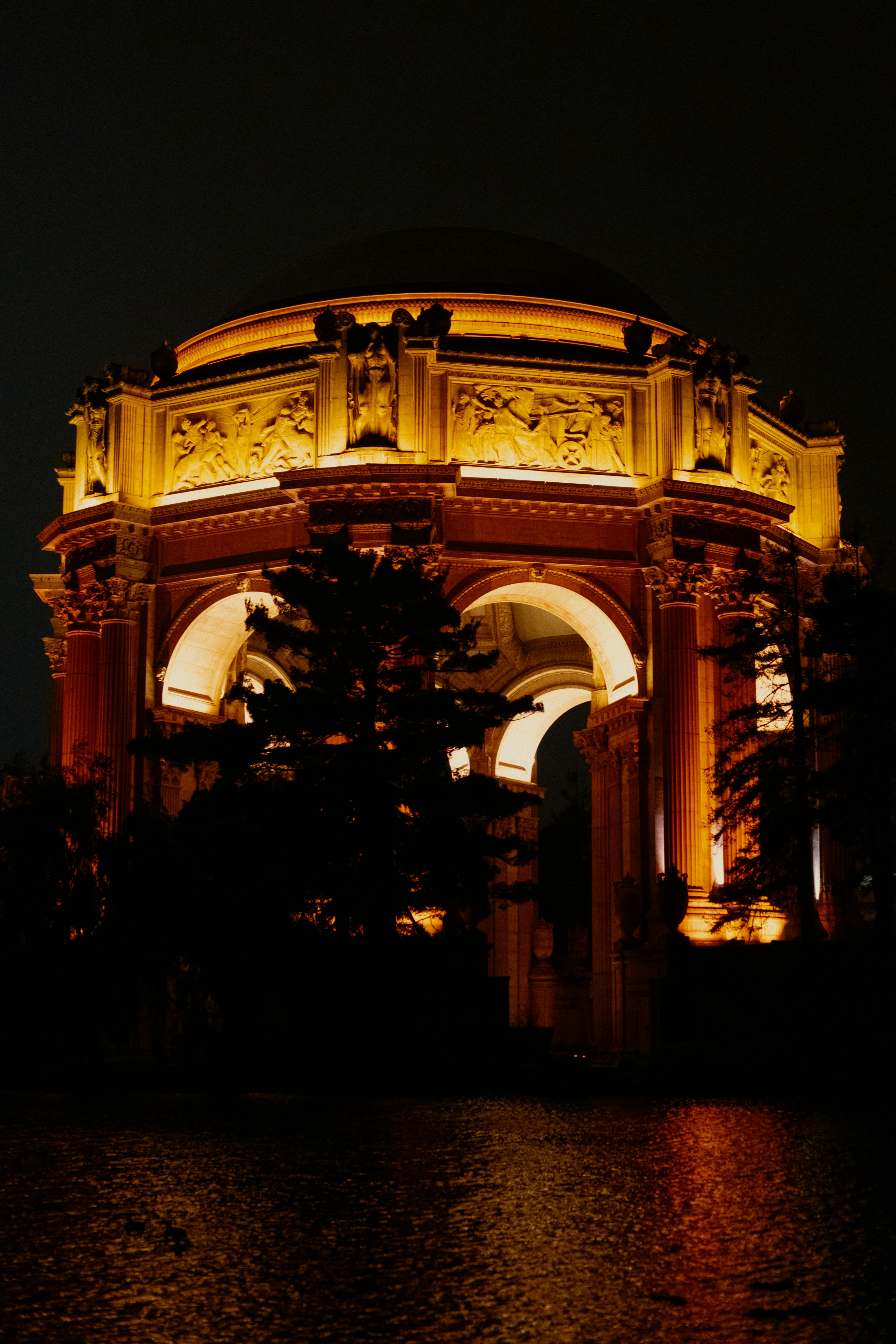 Moonlit Arcadia: The Illuminated Arch in a Night of Firelight