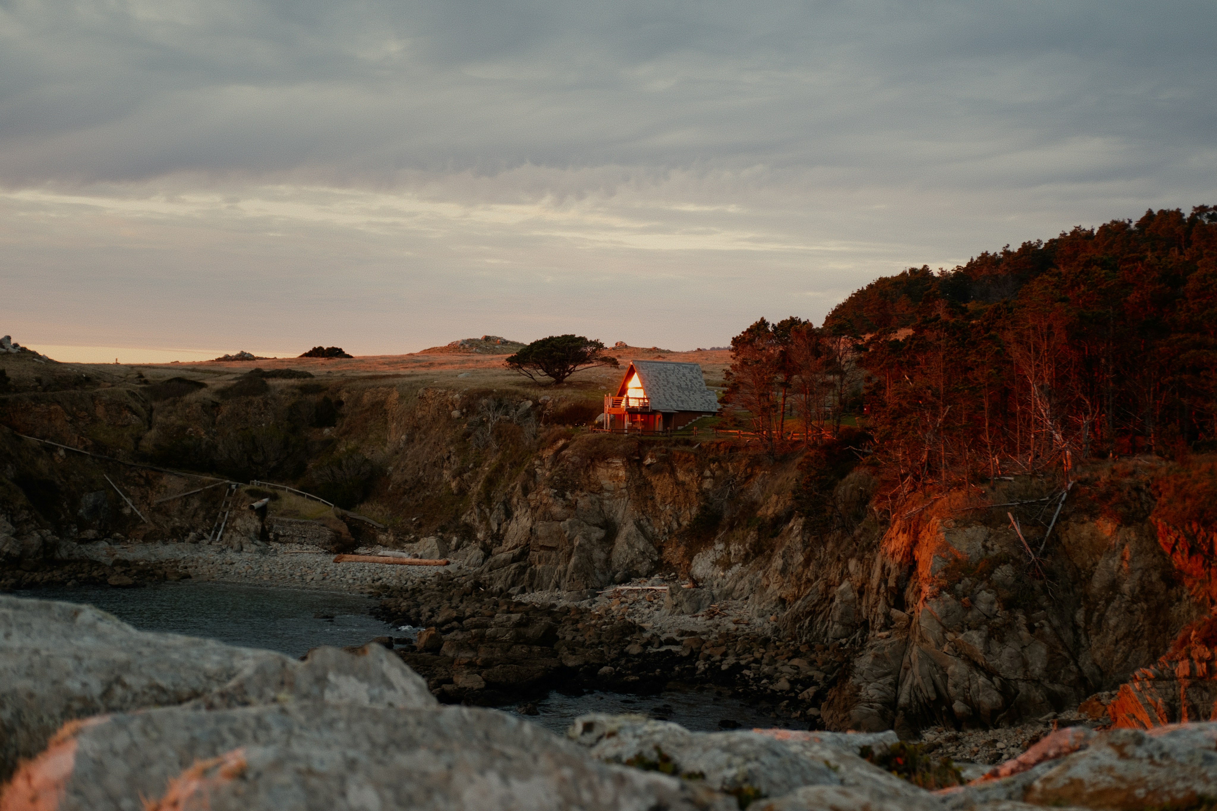 Coastal Cliff House at Golden Hour