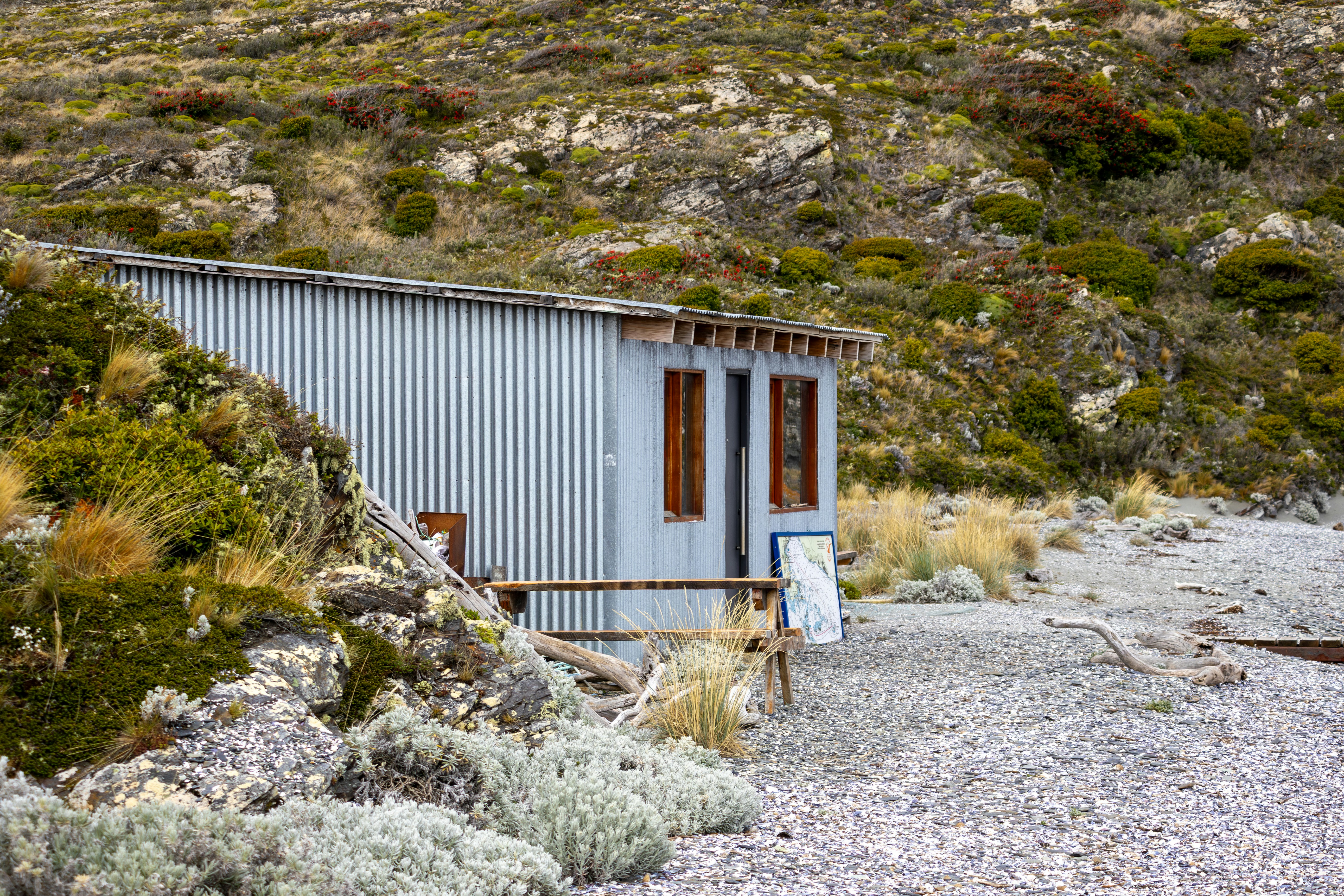 Seaside Shack in a Pebbled Cove