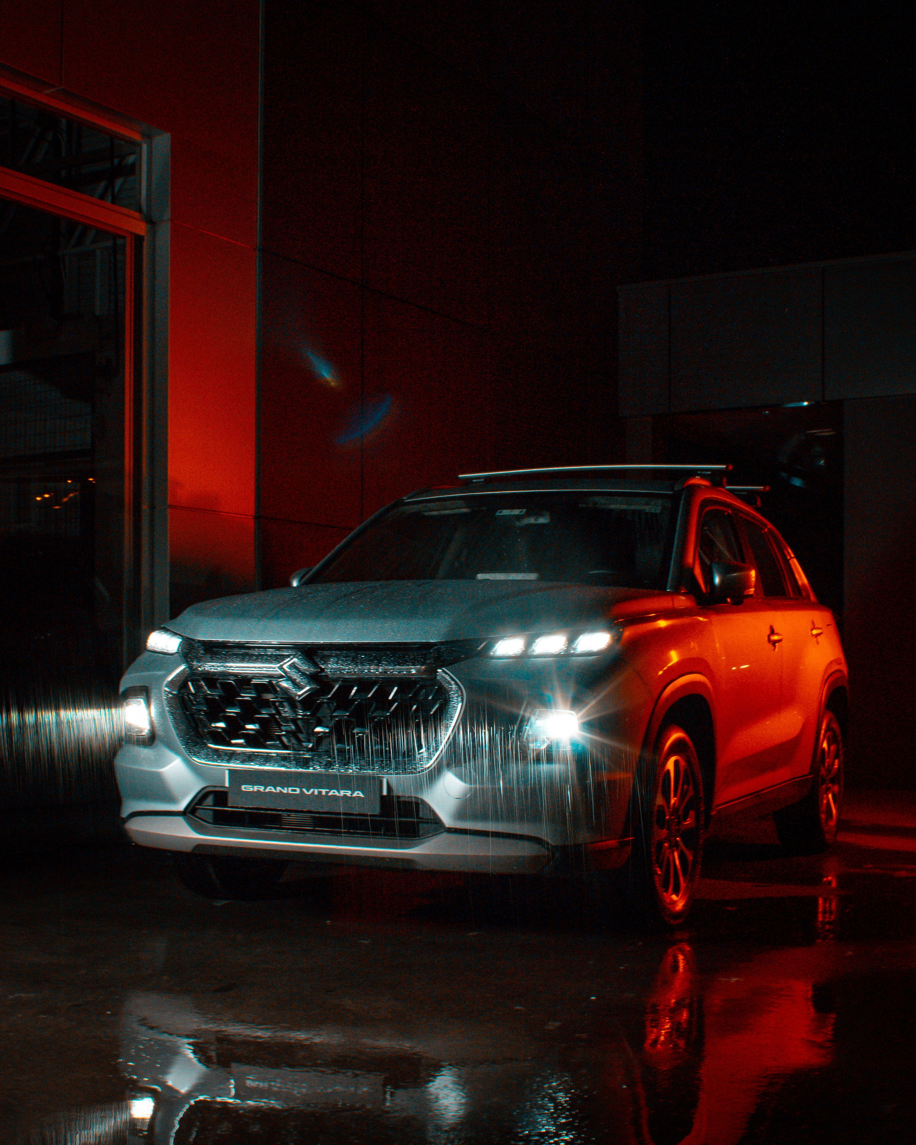 Midnight Suzuki Grand Vitara Emerges from Red Neon Shadows