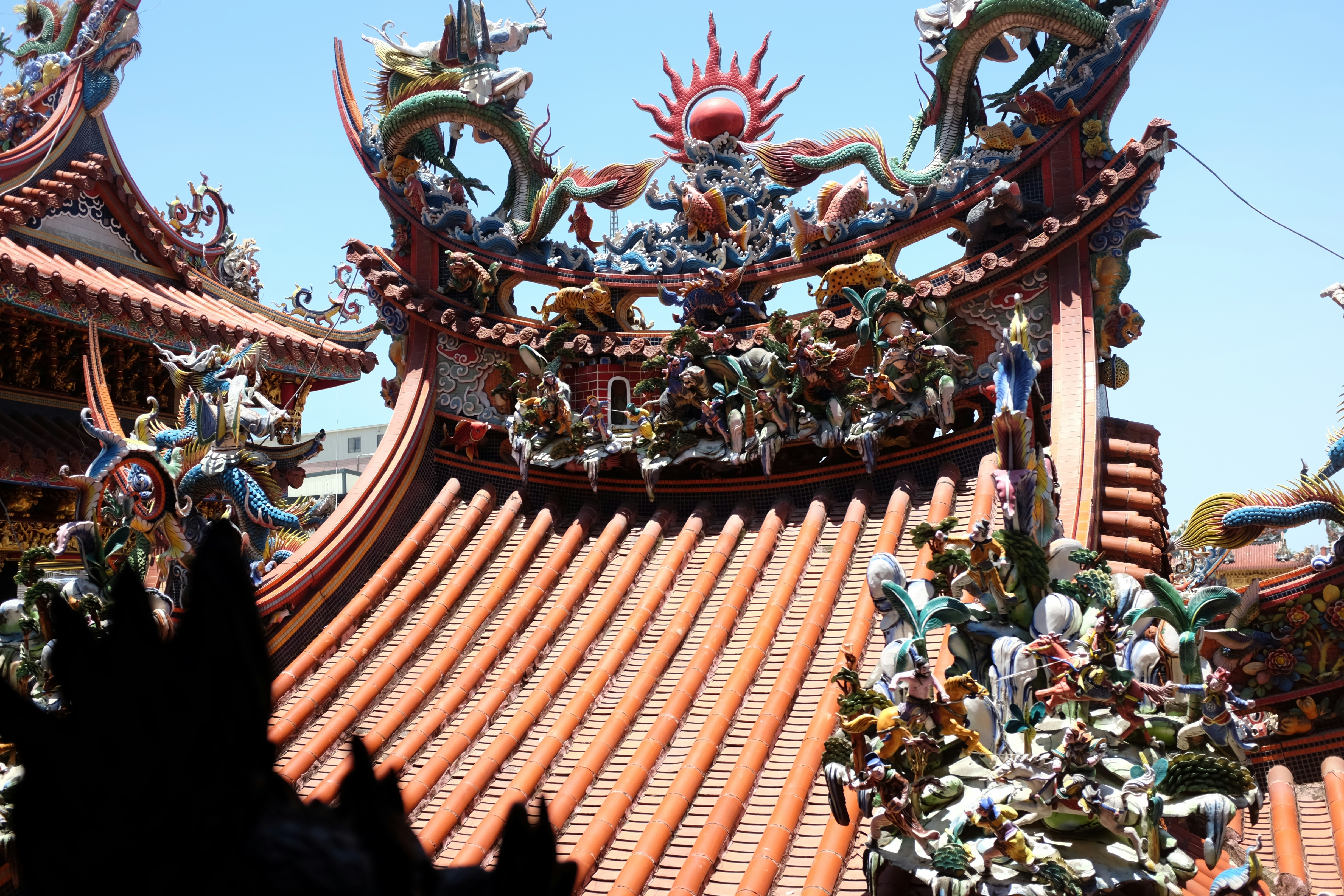 Dragon Crest Over Temple Roofs: A Painted Sky Above Sacred Tiles