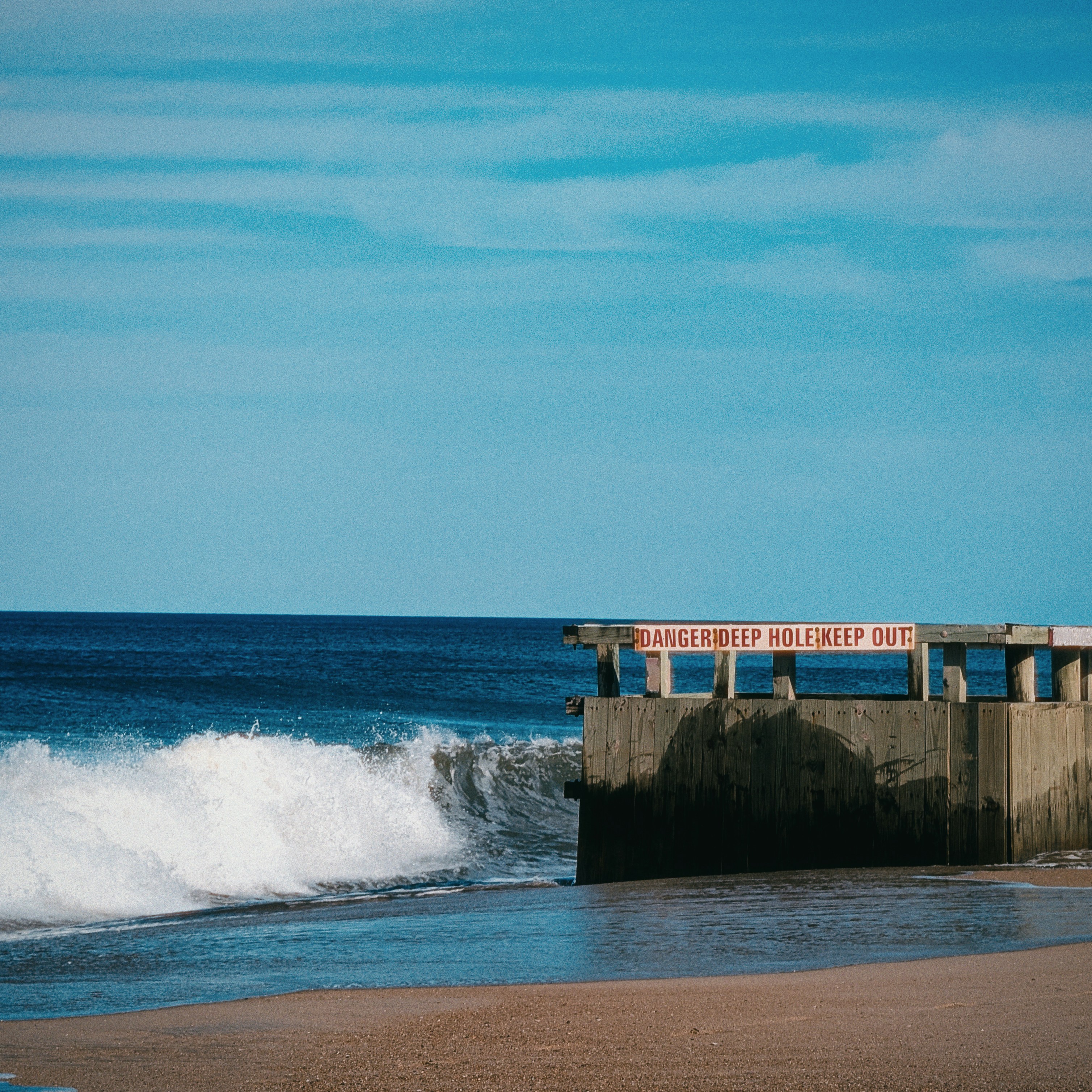 Storm Breaker at the Pier: Waves Meet the Concrete Landing