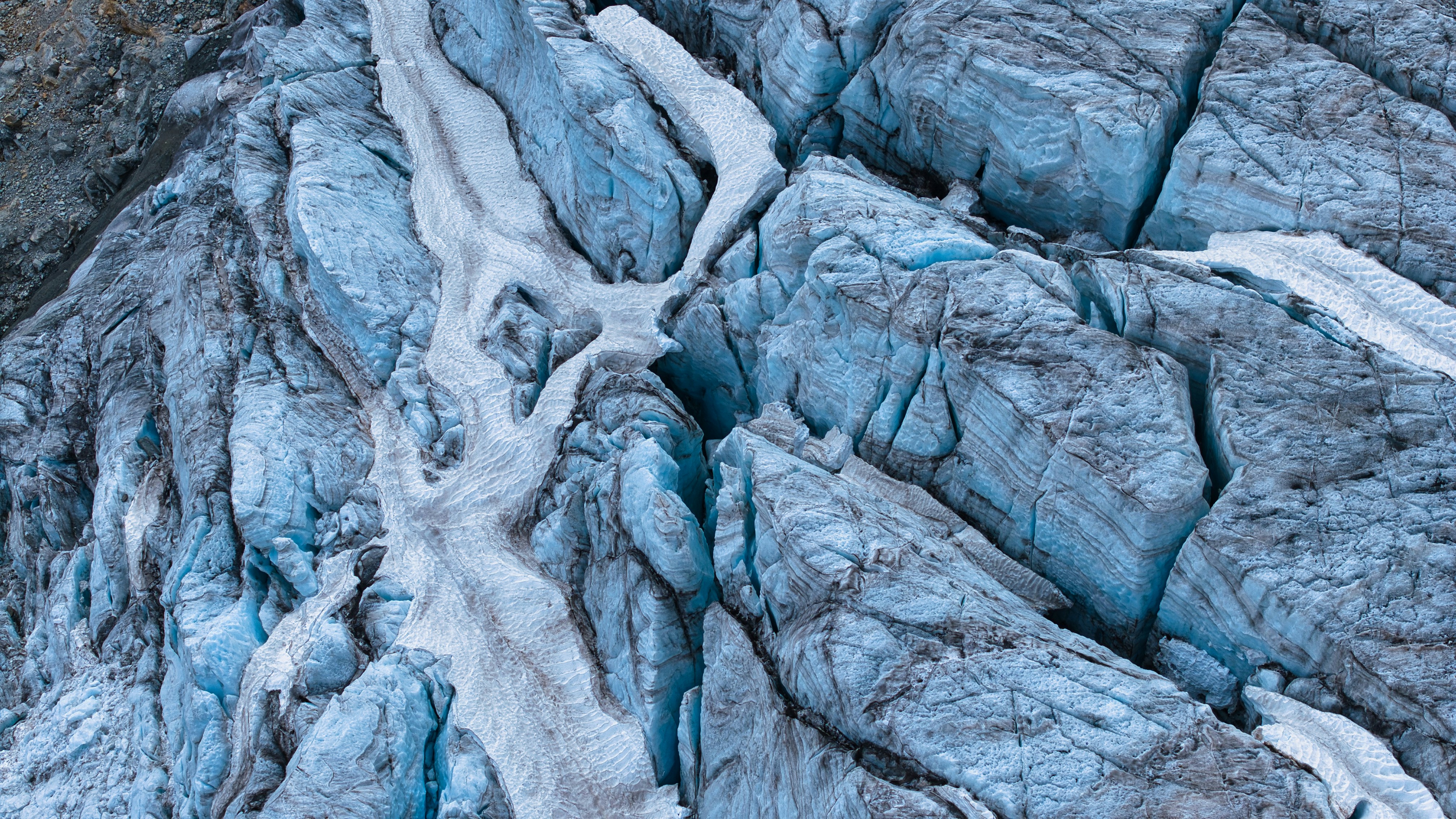 Blue Narrows: Rivulets of Ice Weft Across the Glacier
