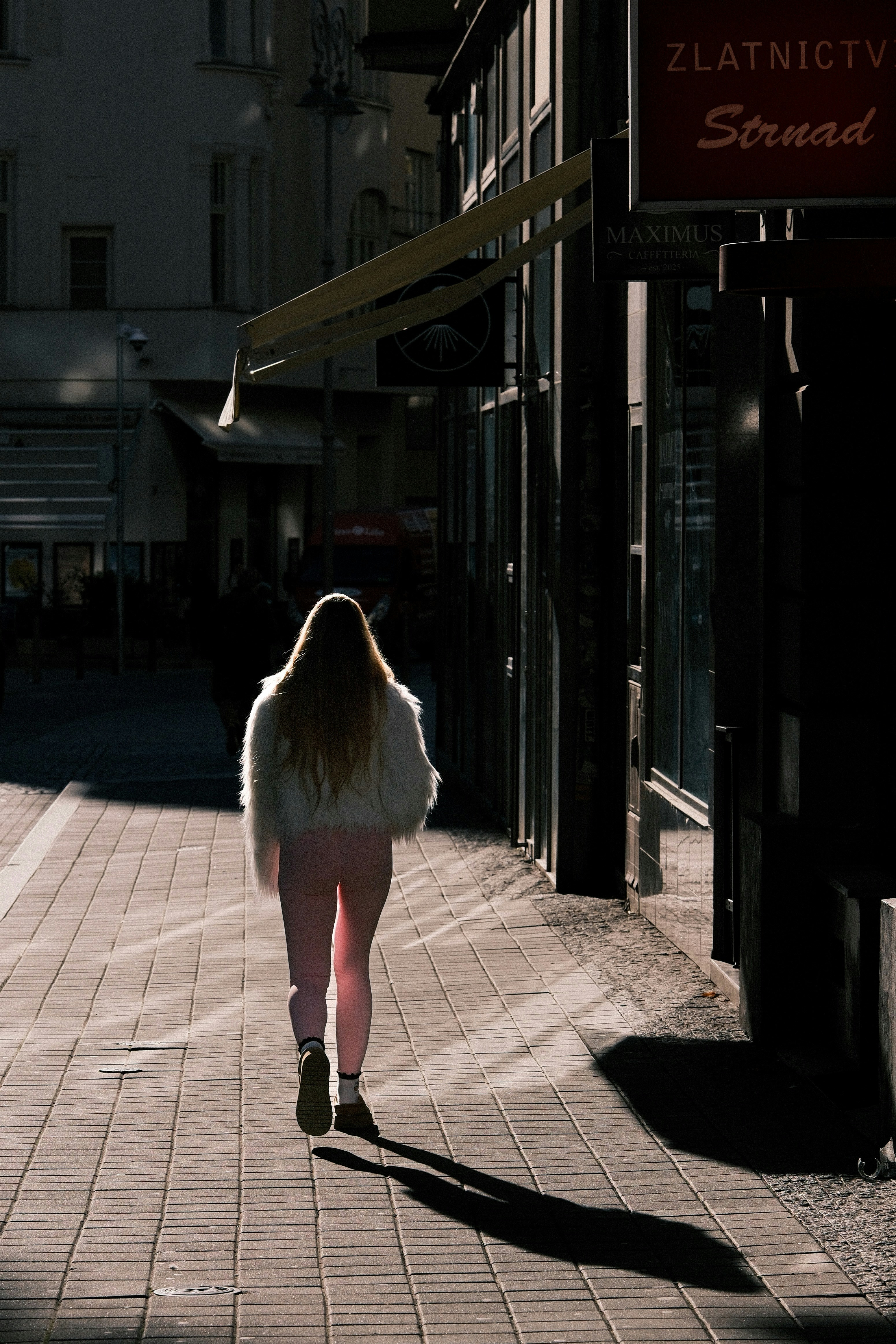 Backlit Quiet Street Stroll